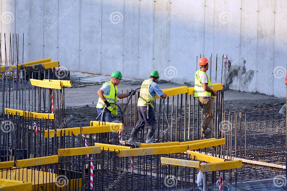 Back View of a Construction Worker Walking into a Building Site ...