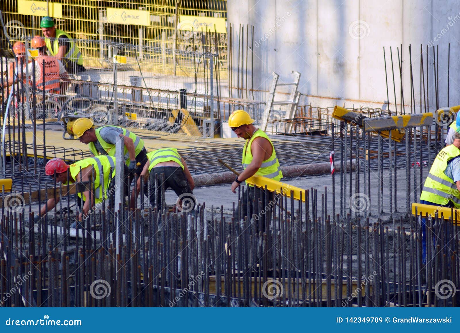 Back View of a Construction Worker Walking into a Building Sites ...