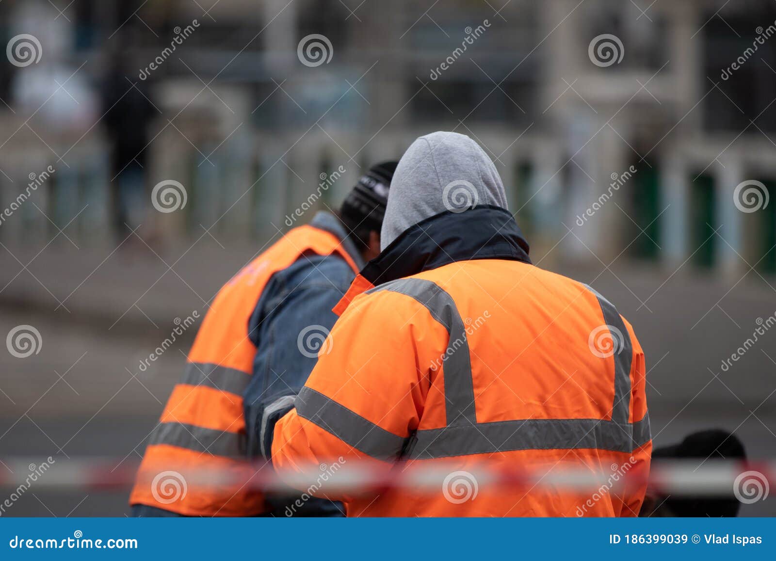 Back View of Construction Worker Wearing Dirty Reflective Jacket ...