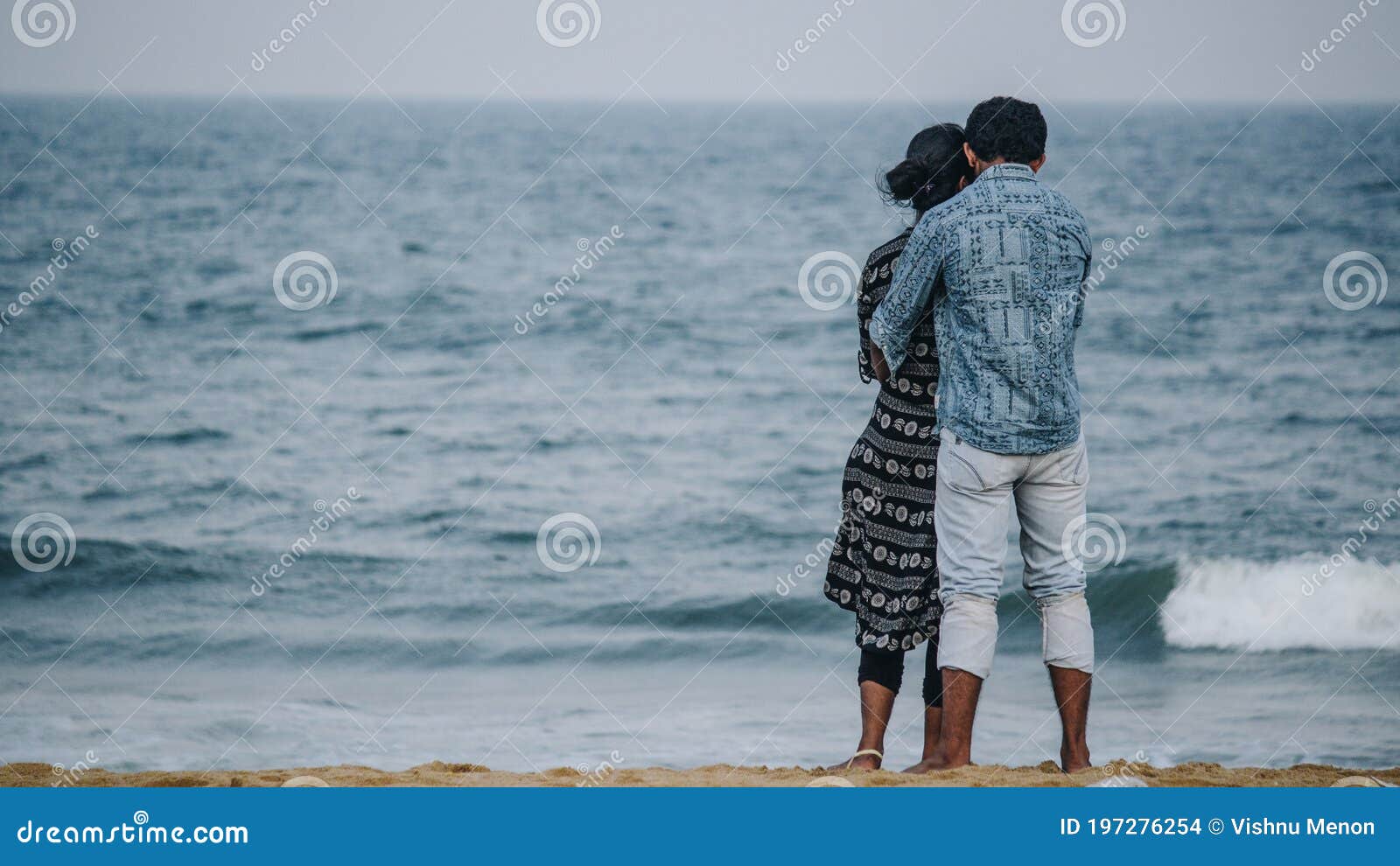 Back View of a Couple Cuddling at the Beach Stock Photo - Image of ...