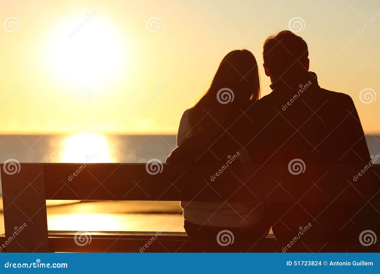 Back View of a Couple Watching Sun on the Beach Stock Photo - Image of ...