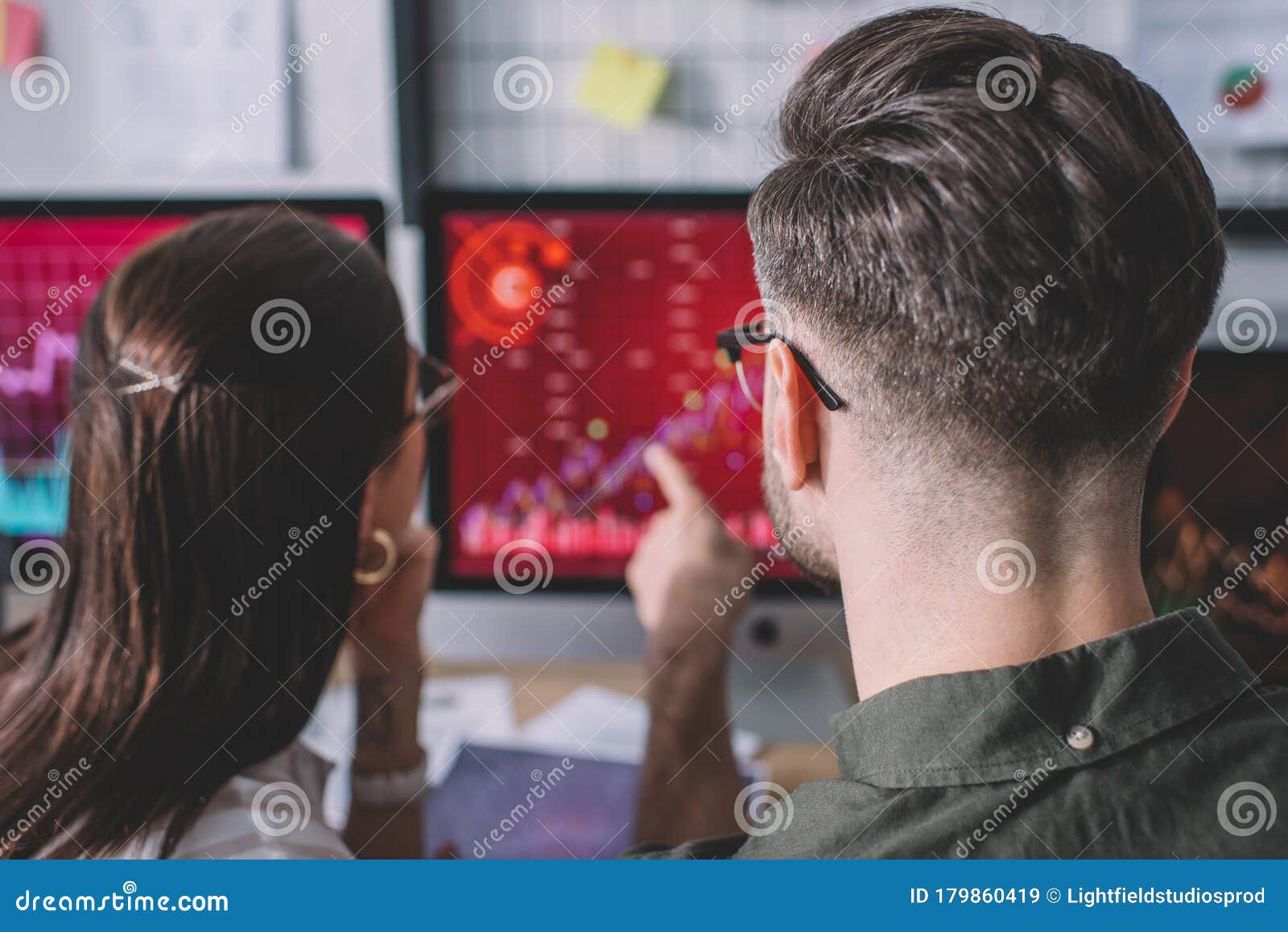 Back View of Data Analysts Working on Protection of Computer Systems ...