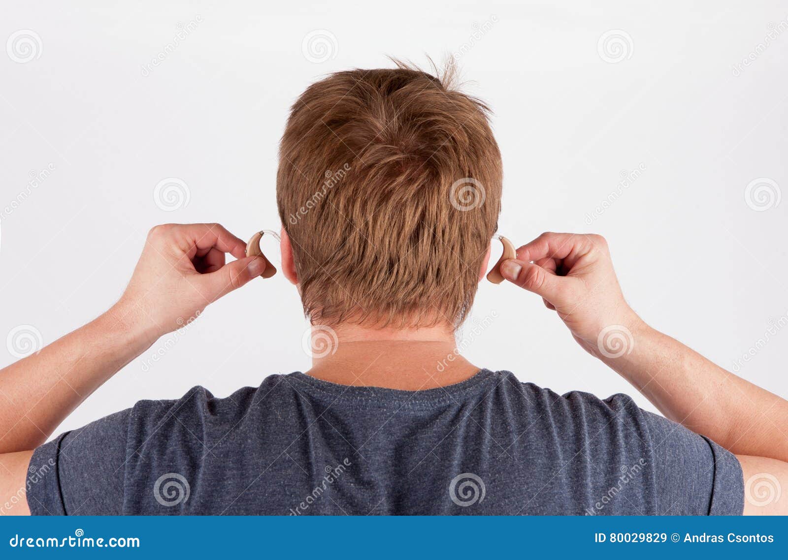 Back View of a Deaf Man S Head and Hands Inserting His Hearing a Stock ...