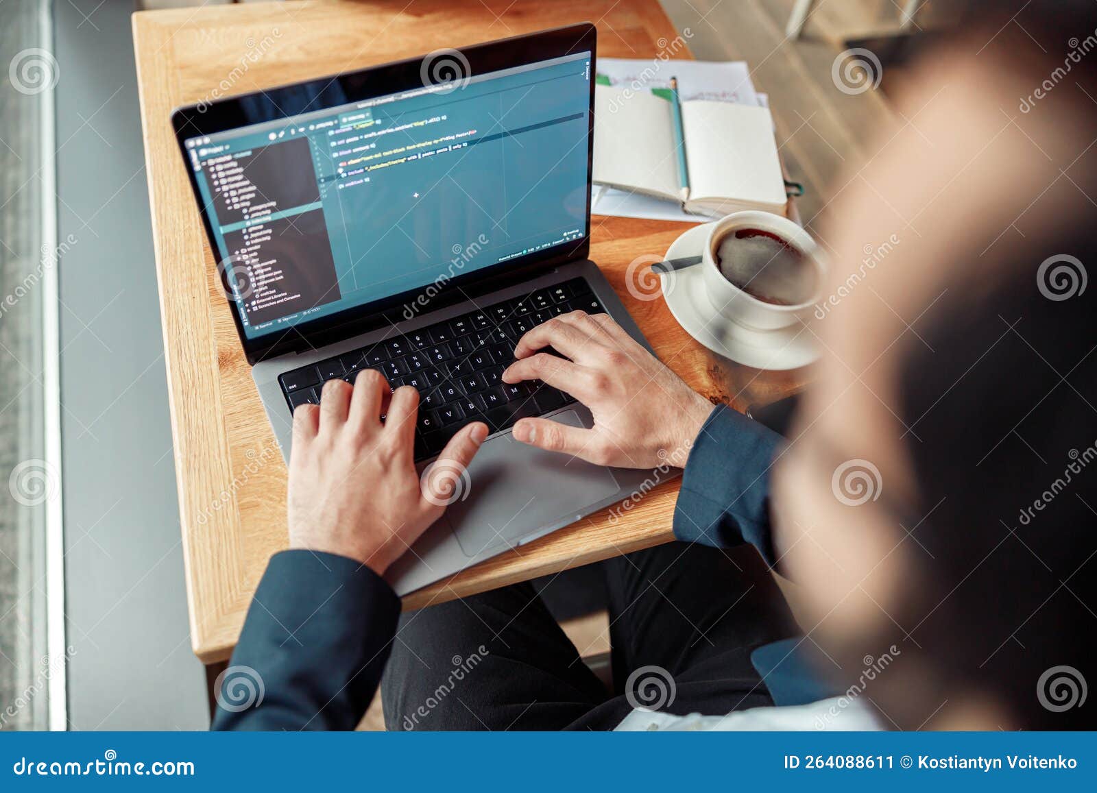 Back View of Developer Programmer Freelancer Working on Project in Cafe ... Back View of Developer Programmer Freelancer Working on Project in Cafe ...