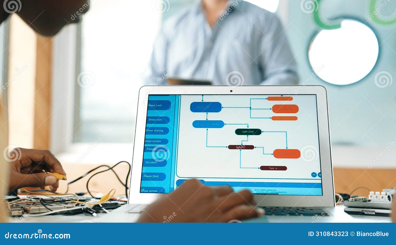 Back View of Diverse Student Code System while Pointing at Screen ...