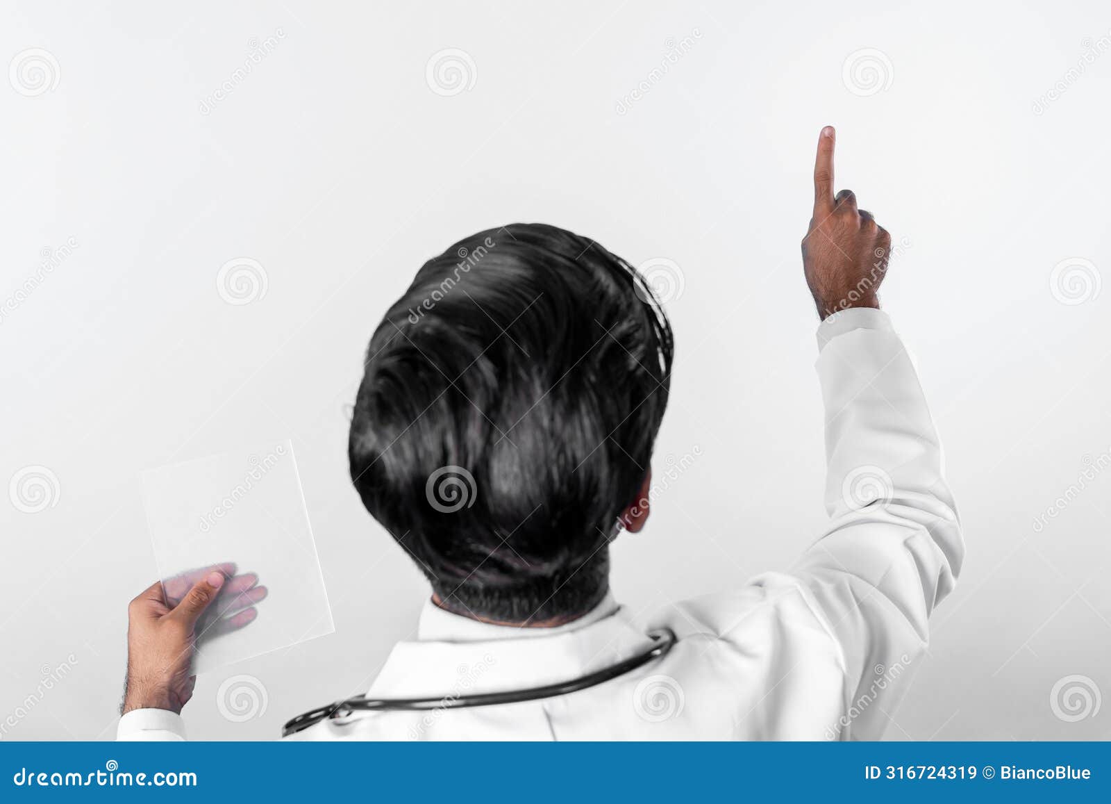 Back View of Doctor Pointing at Medical Data by Using VR Goggles ...