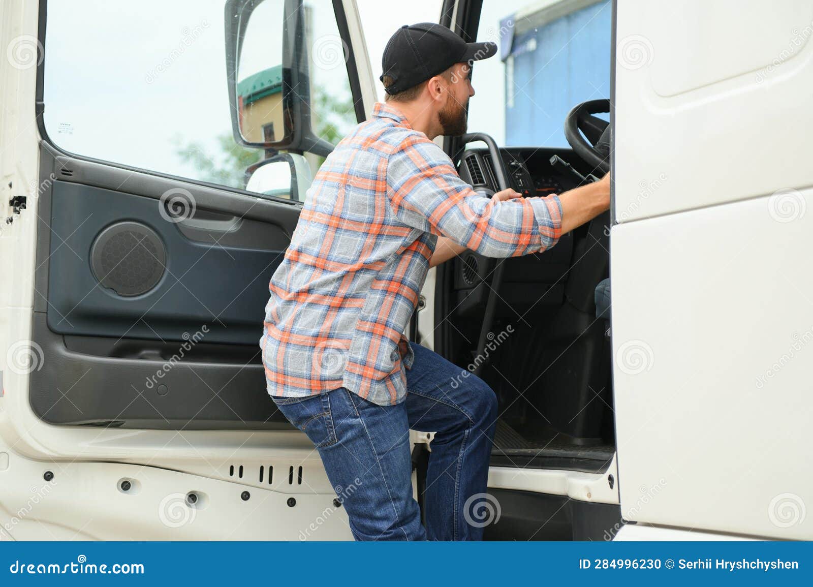 Back View of Driver Getting into Truck Cabin. Stock Photo - Image of ...