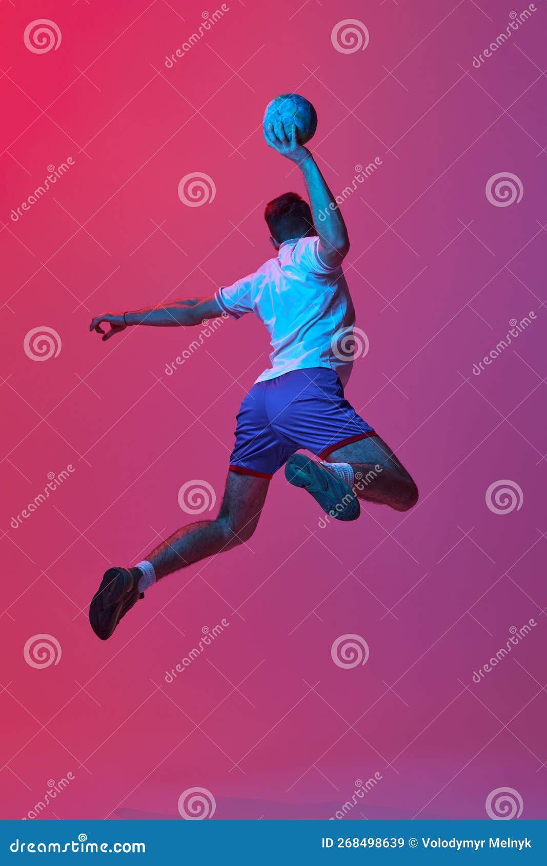 Back View. Dynamic Studio Shot of Professional Male Handball Player in ...