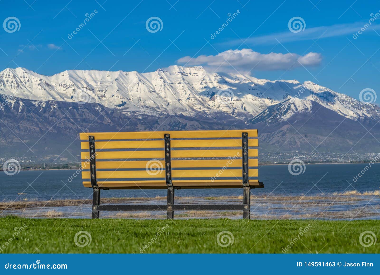 Back View of an Empty Bench Overlooking a Calm Lake on a Sunny Day ...