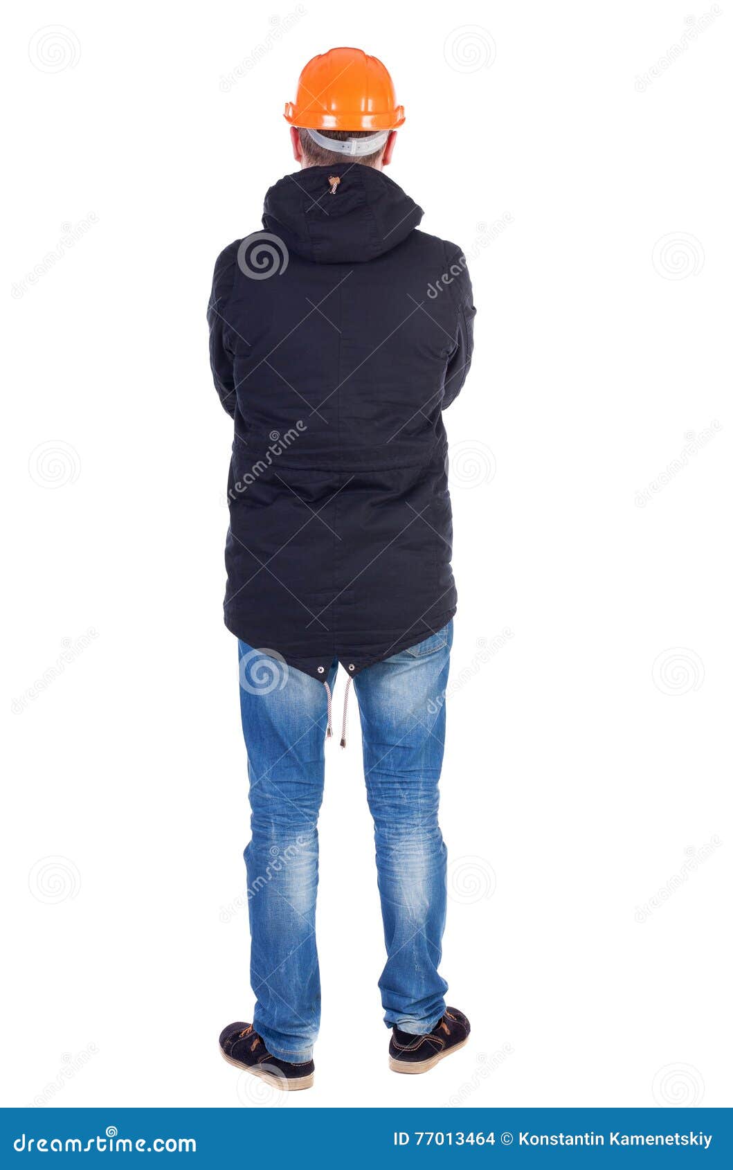 Back View of an Engineer in Construction Helmet Stands. Stock Photo ...