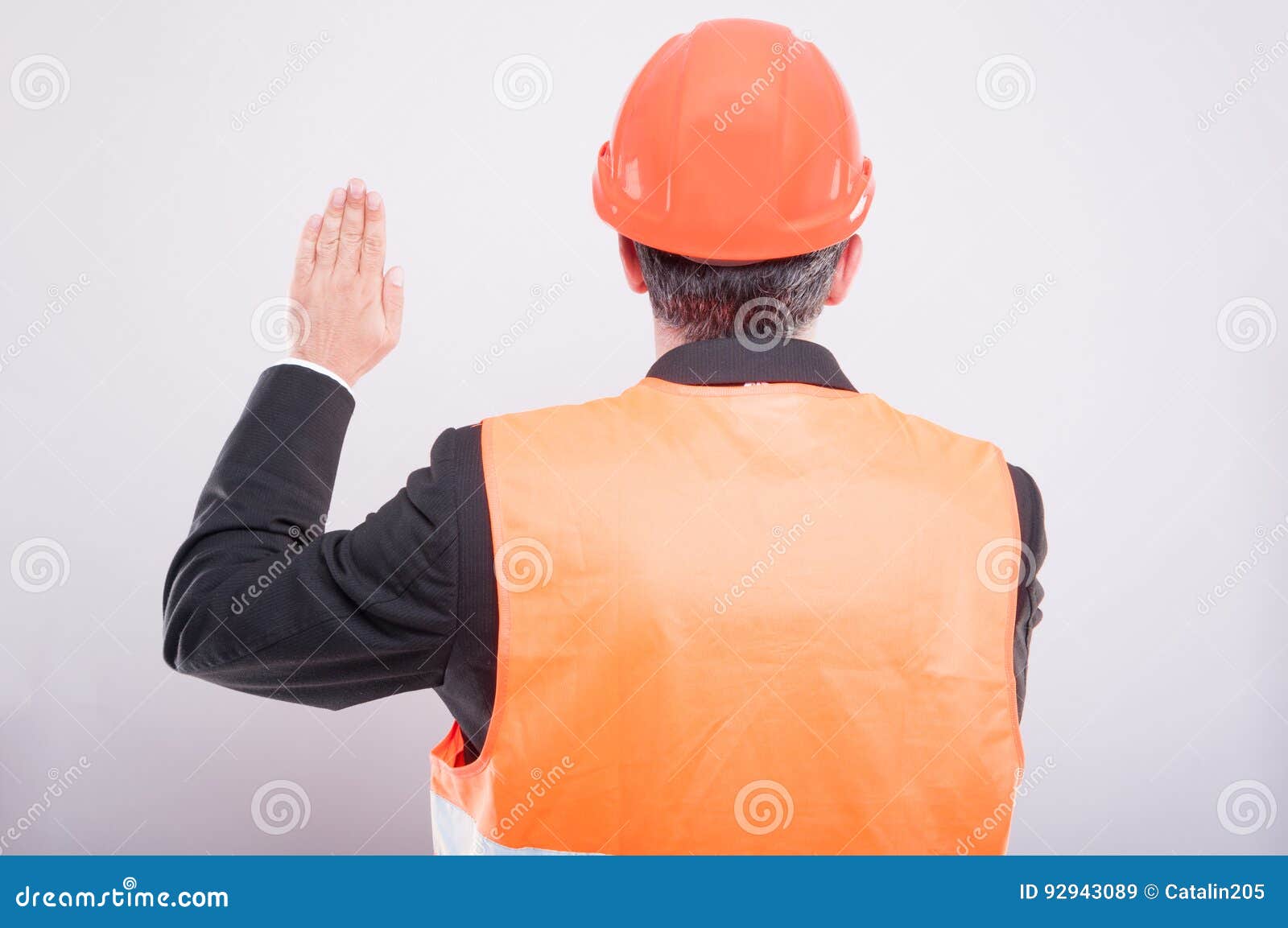 Back View of Engineer Wearing Hardhat Making Oath Gesture Stock Image ...