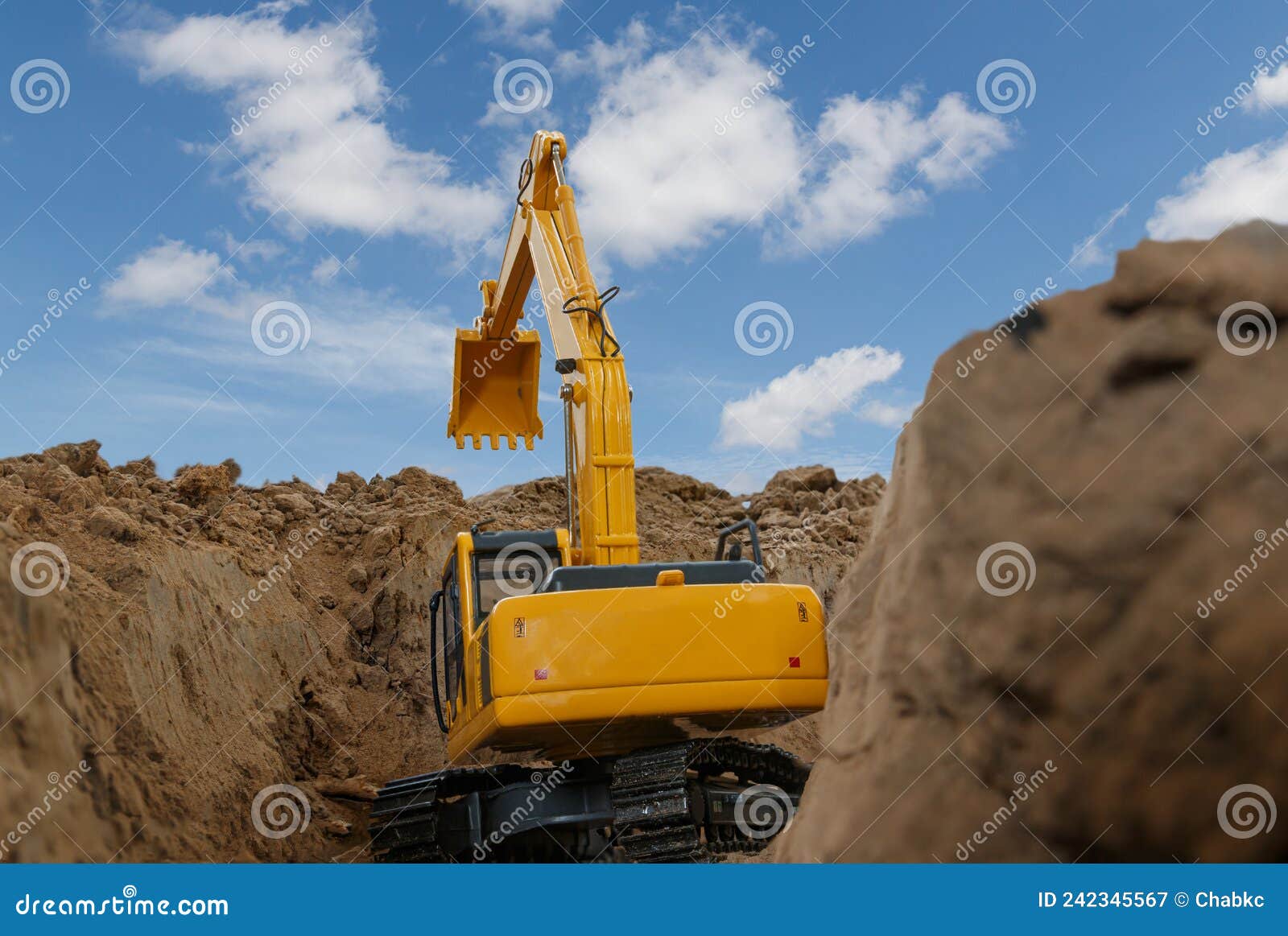 Back View of Excavator are Digging the Soil. Stock Image - Image of ...