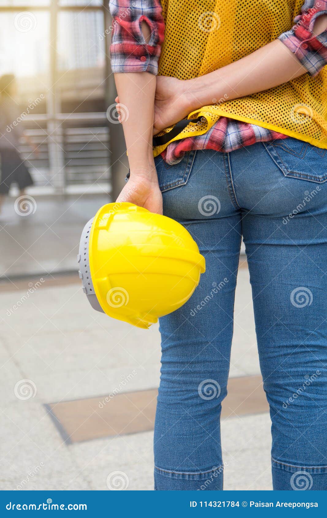 Back View of Female Architecture in Front of Construction Site Stock ...