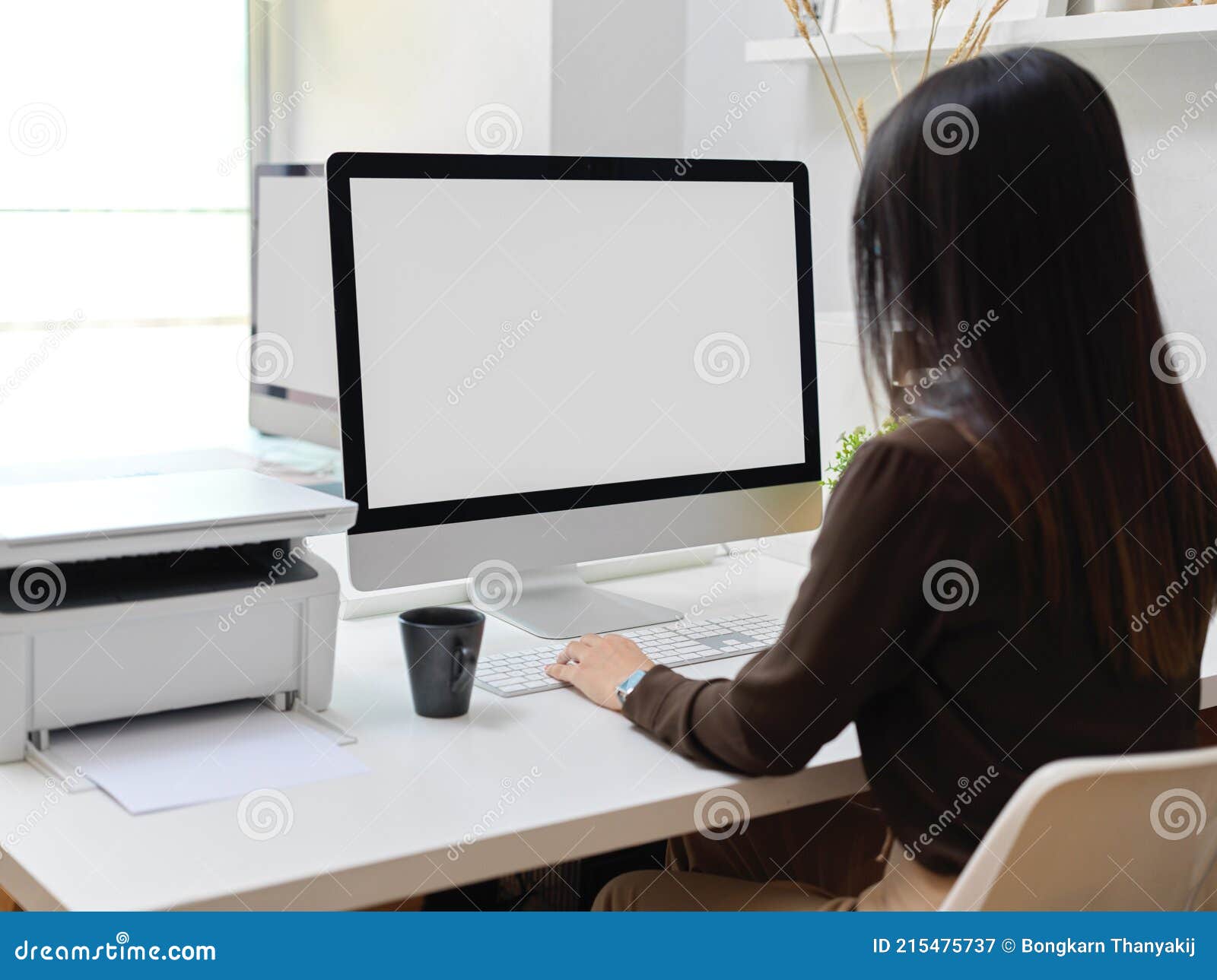 Back View of Female Office Worker Working with Computer Device in ...