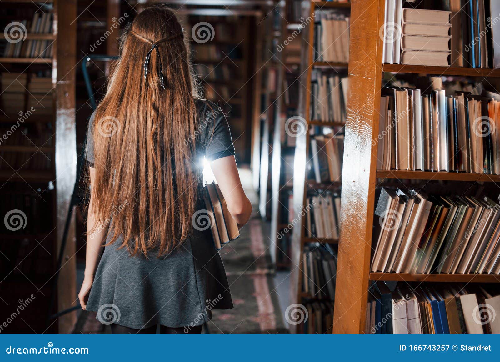 Back View. Female Student is in Library that Full of Books Stock Image ...