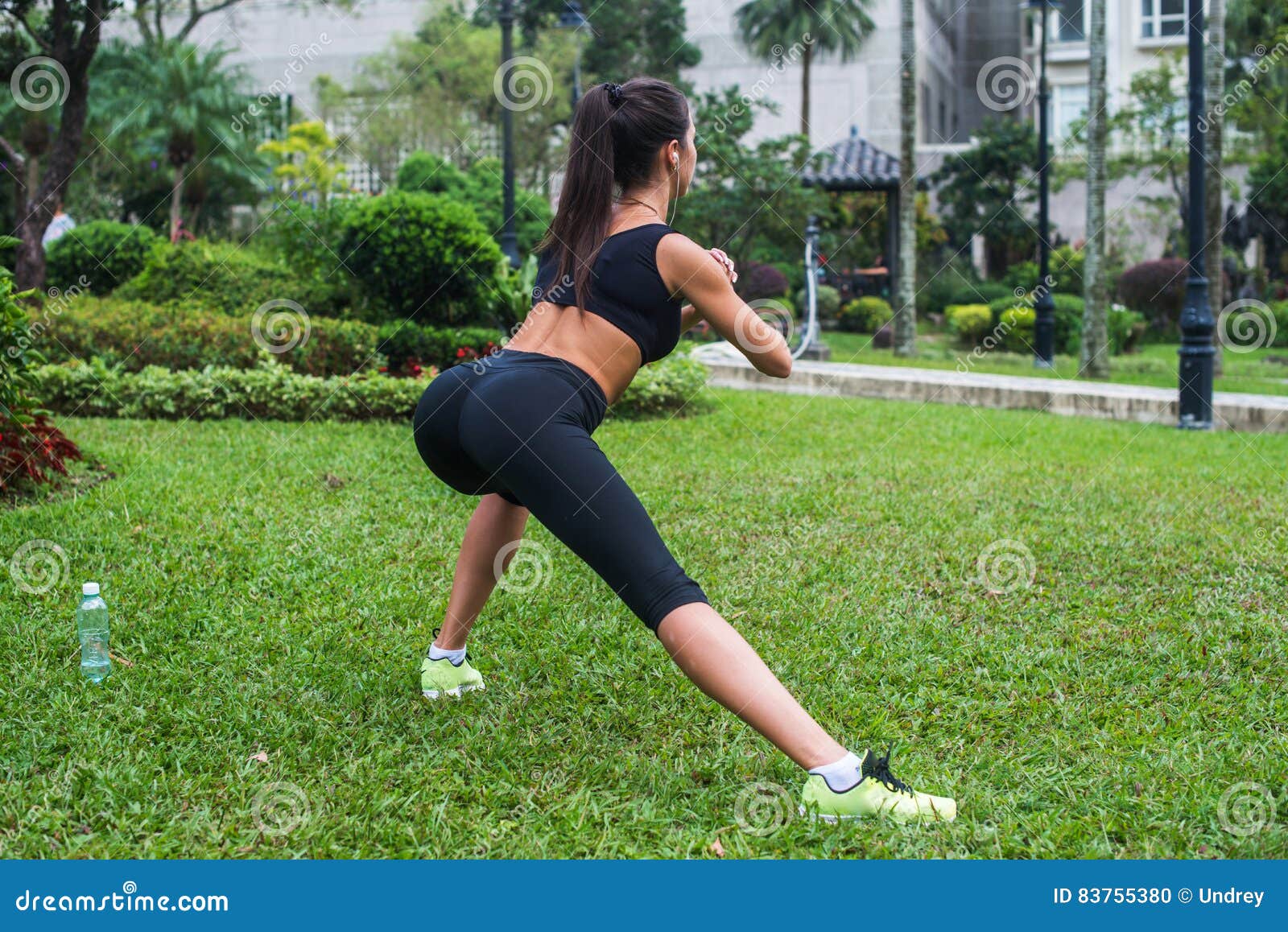 Back View of Fit Girl Doing Side Lunge Exercises Outdoors Stock Photo ...