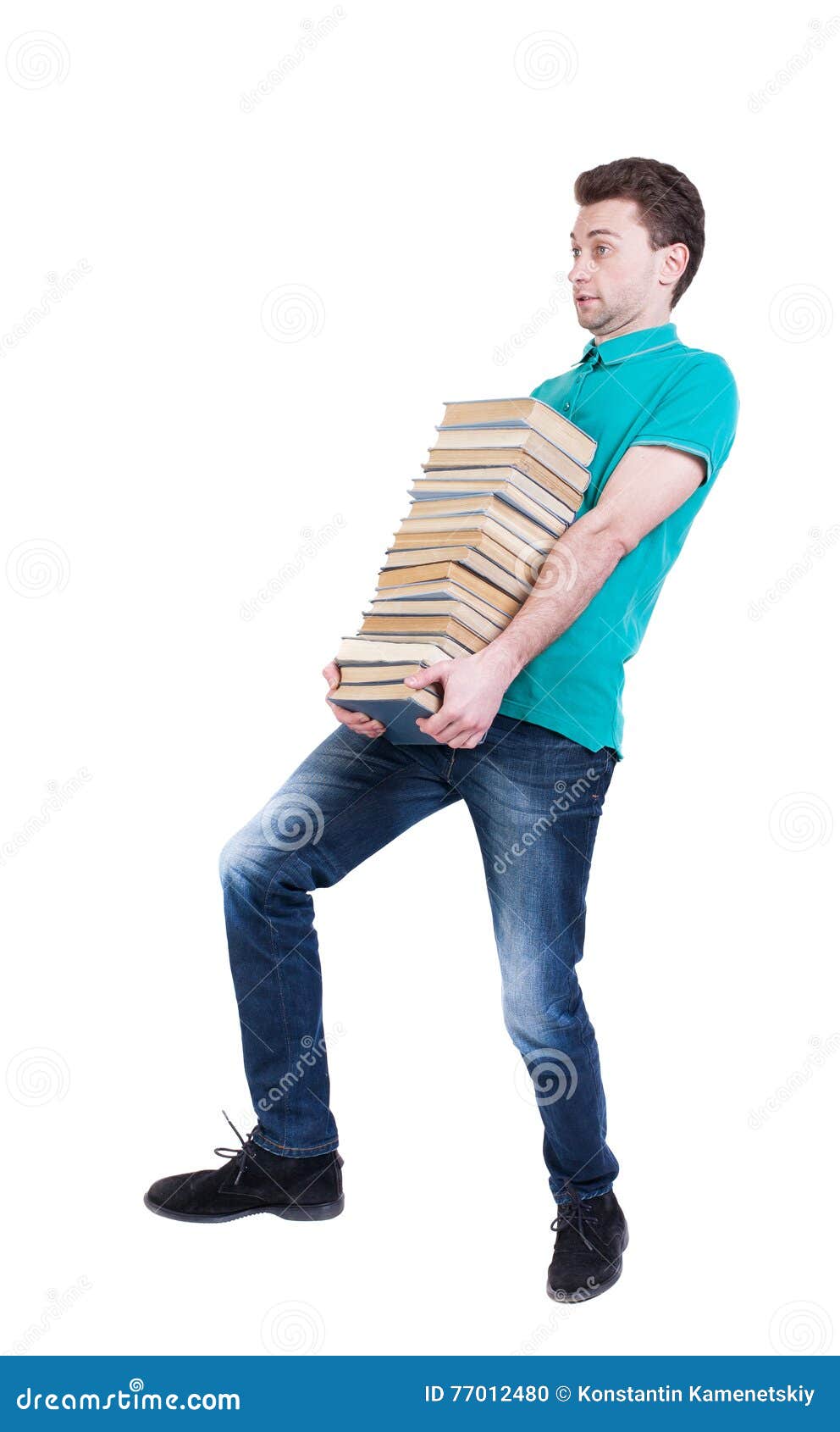 Back View of Going Handsome Man Carries a Stack of Books. Stock Photo ...