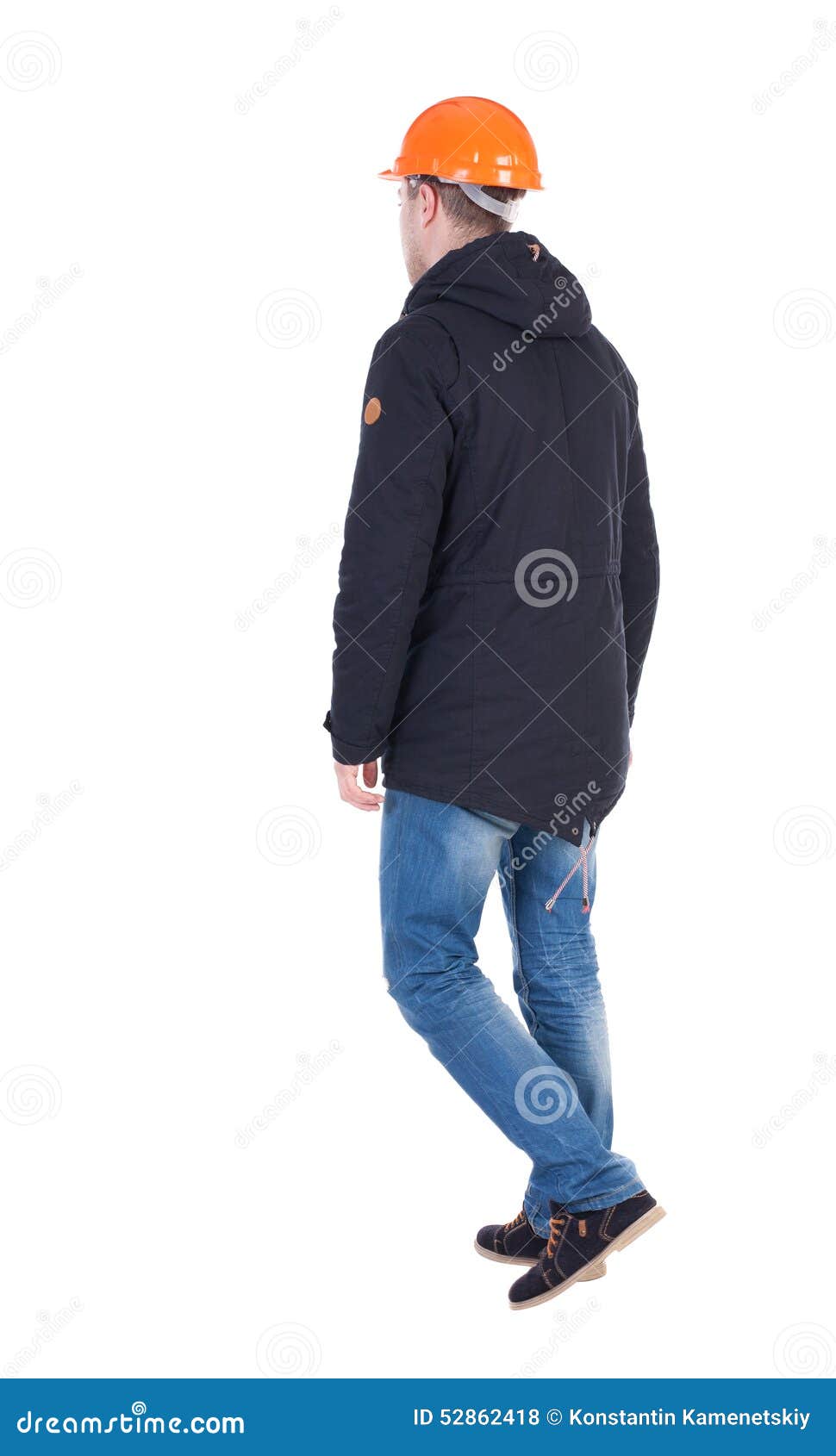 Back View of GoingWorker in a Helmet. Walking Young Engineer Stock ...