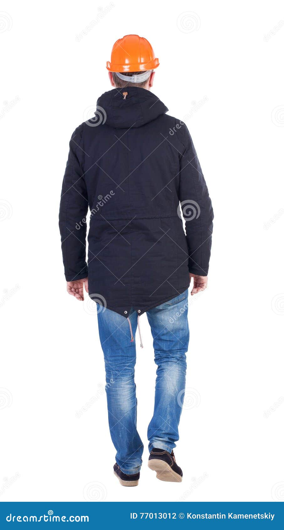 Back View of GoingWorker in a Helmet. Walking Young Engineer Stock ...