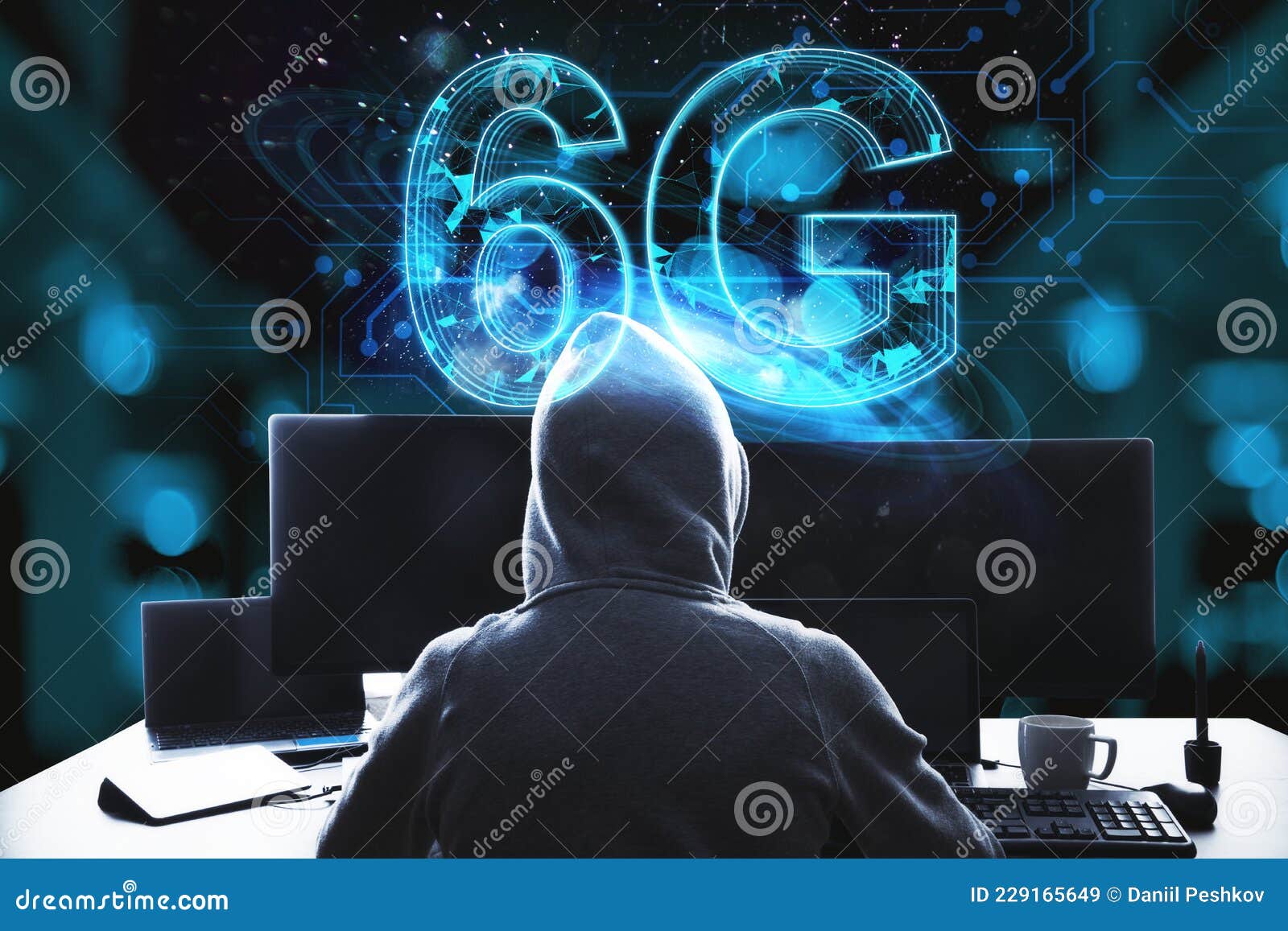 Back View of Hacker at Desktop Using Computers with Glowing Blue 6G ...