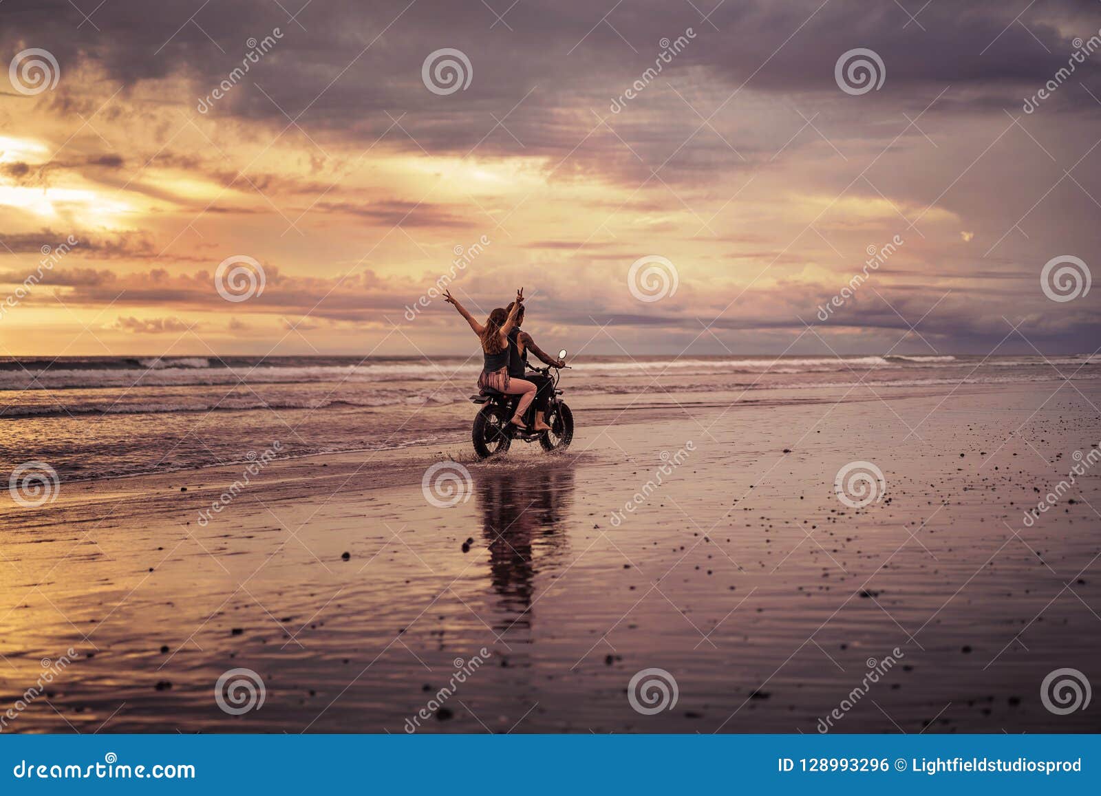 Man And Motorcycle On Ocean Beach At Beautiful Tropical Sunset ...