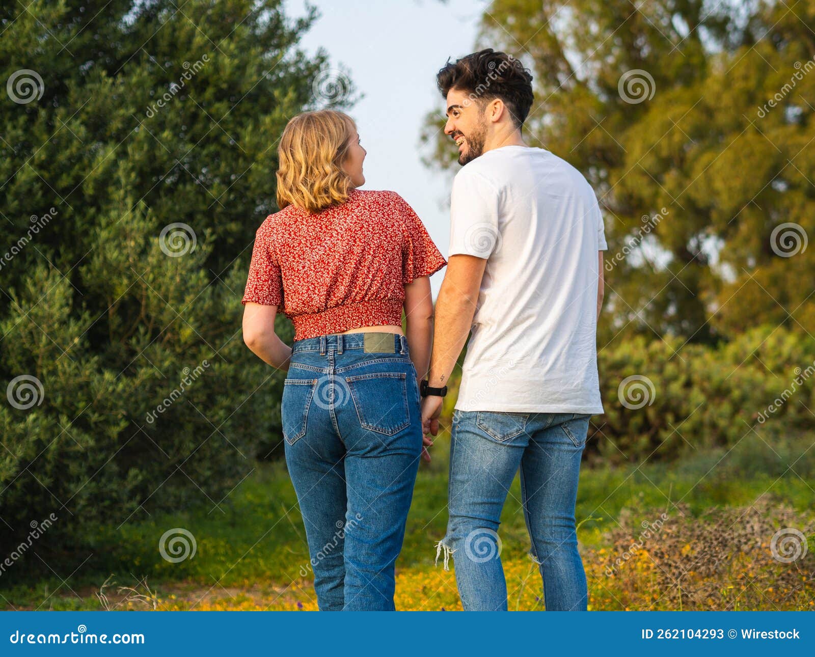 Back View of a Happy Spanish Couple Spending Leisure Time Together ...