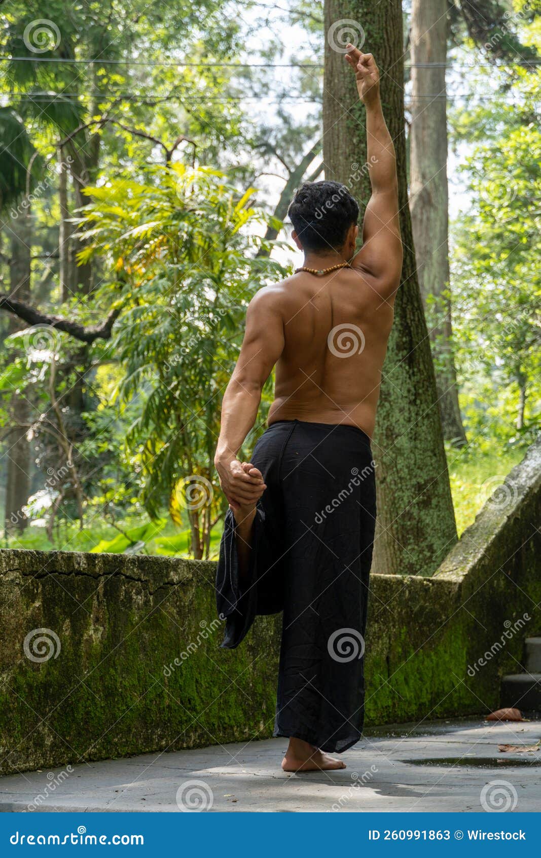 Back View of a Hispanic Male Exercising Yoga Stock Image - Image of ...