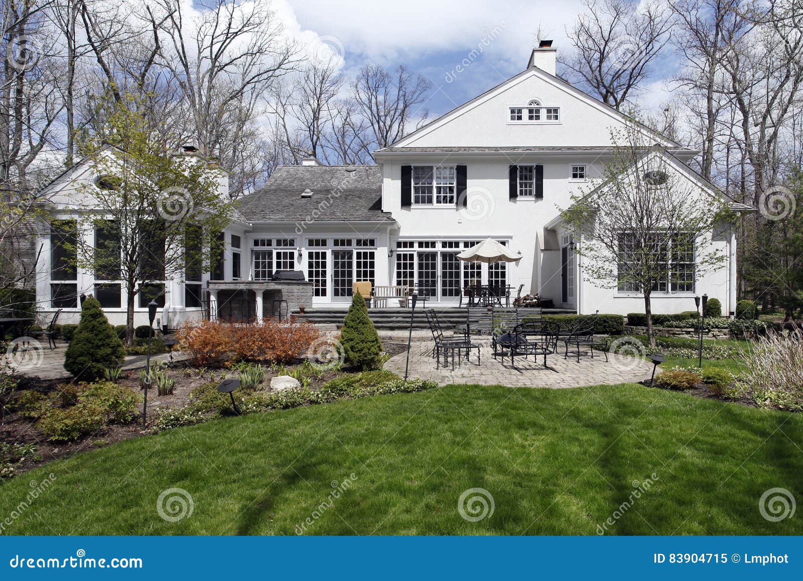 Back View of Home with Brick Patio Stock Image - Image of home, suburbs ...