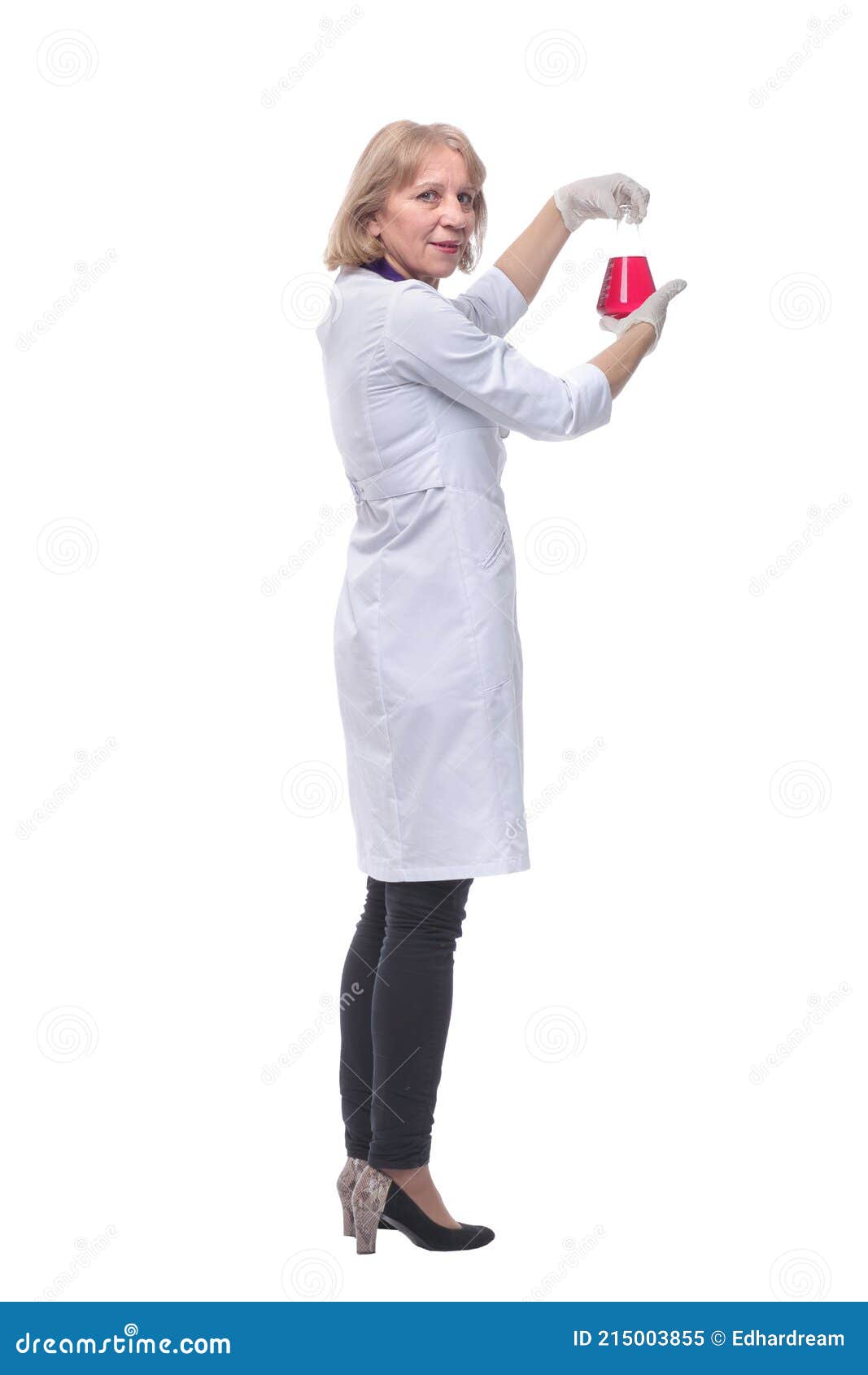 Back View Of A Lab Scientist Woman With Gloves Observes A Beaker Stock ...