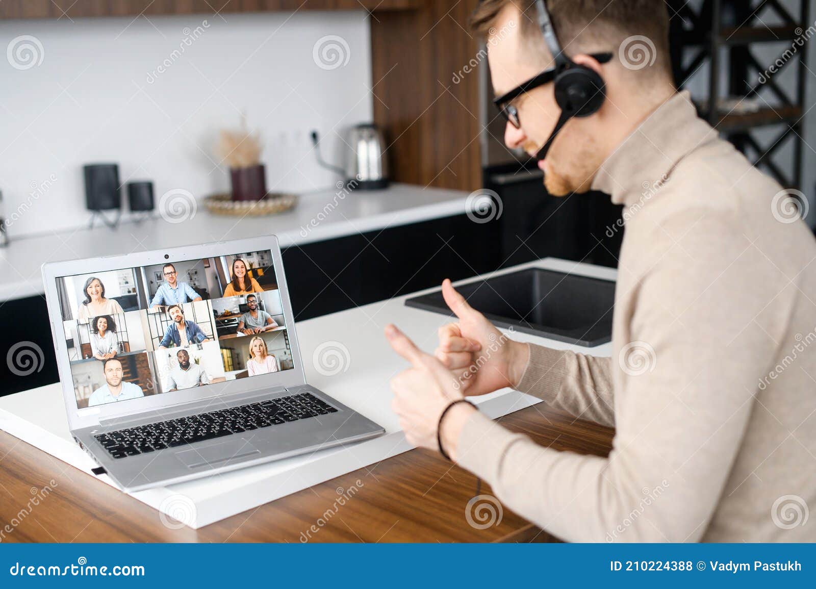 Handsome Bearded Guy Wearing Casual Turtleneck Using a Laptop Stock ...