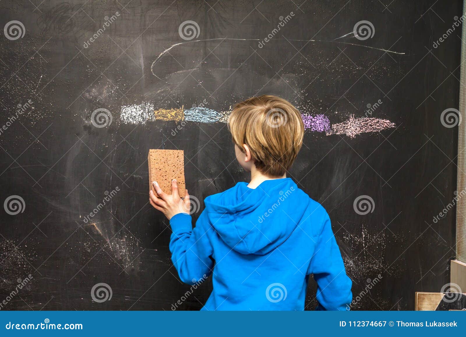 Back View of a Little Boy Cleaning Chalkboard Stock Image - Image of ...