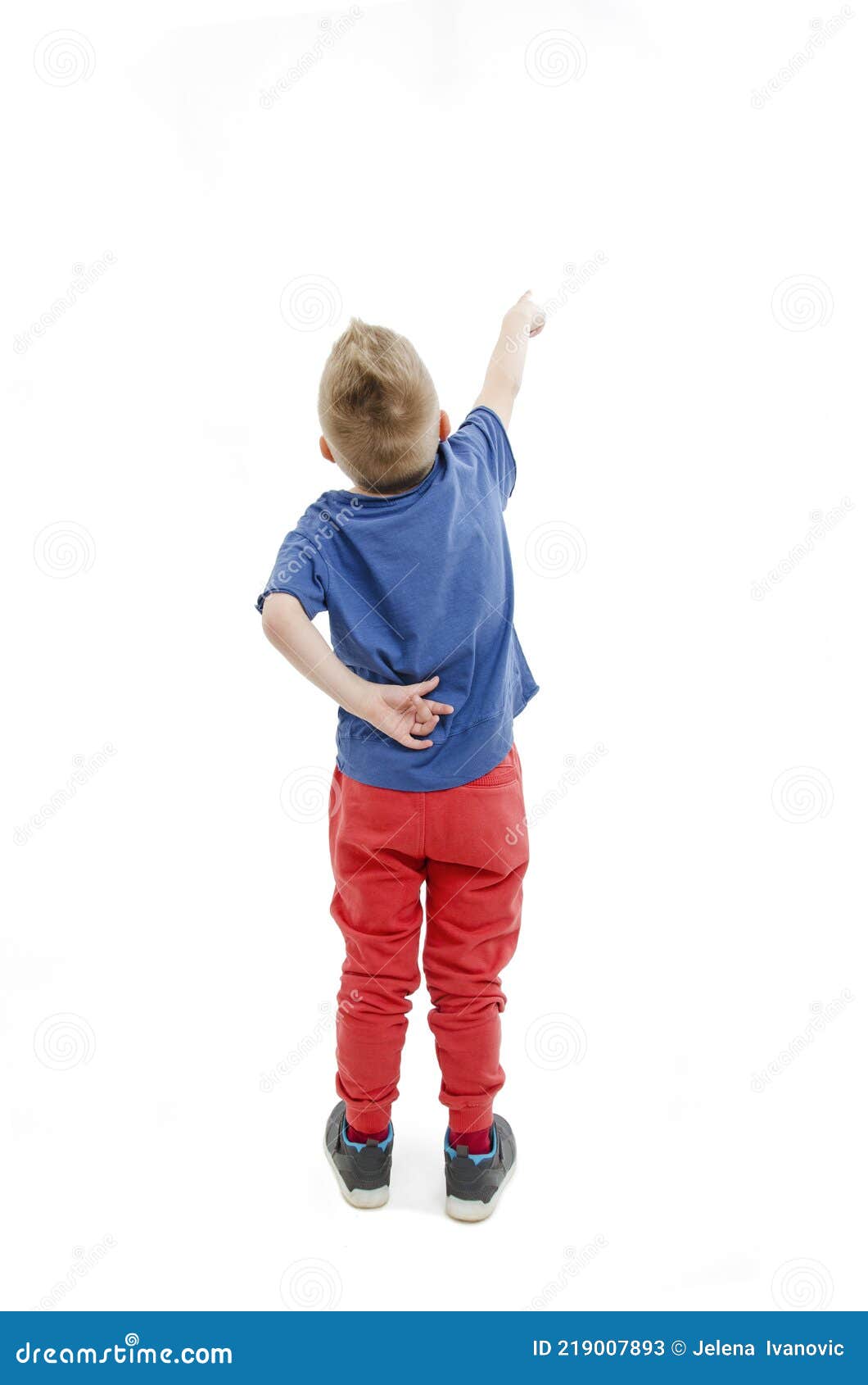 Back View of Little Boy Points at Wall. Rear View Stock Image - Image ...
