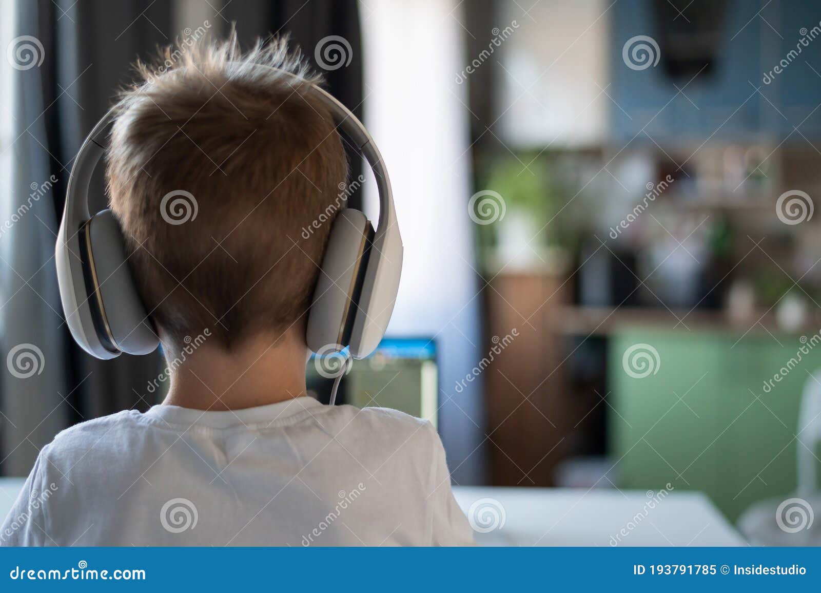 Back View of a Little Boy Wearing Headphones. Stock Image - Image of ...