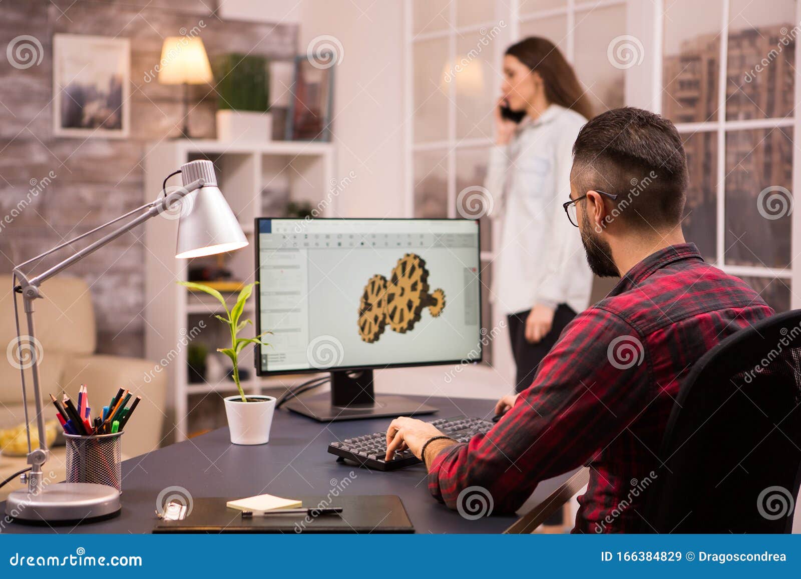 Back View of Male Engineer Drawing a Mechanical Prototype Stock Image ...