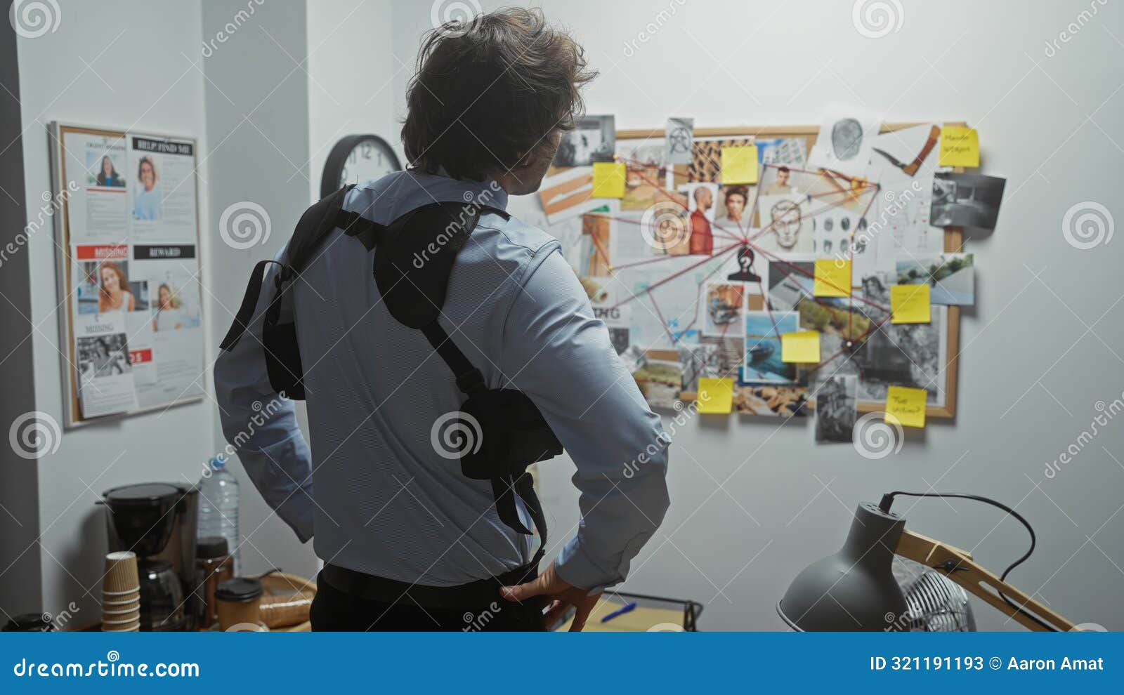 Back View of a Man Analyzing a Complex Investigation Board Inside a ...