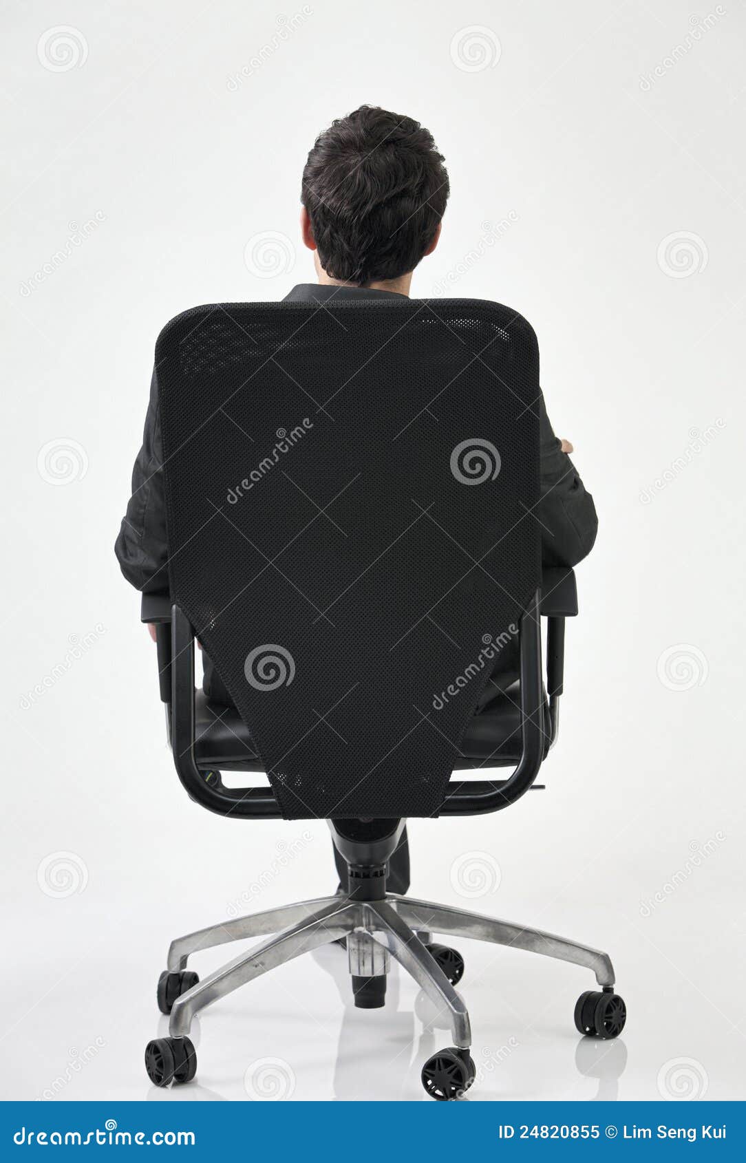 Back view of man on chair stock image. Image of black - 24820855