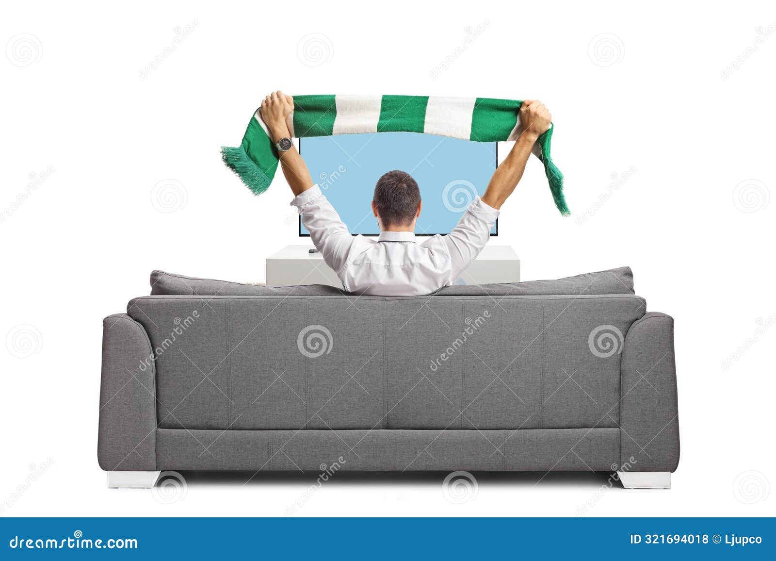 Back View of a Man Cheering with a Scarf in Front of a Tv Screen Stock ...