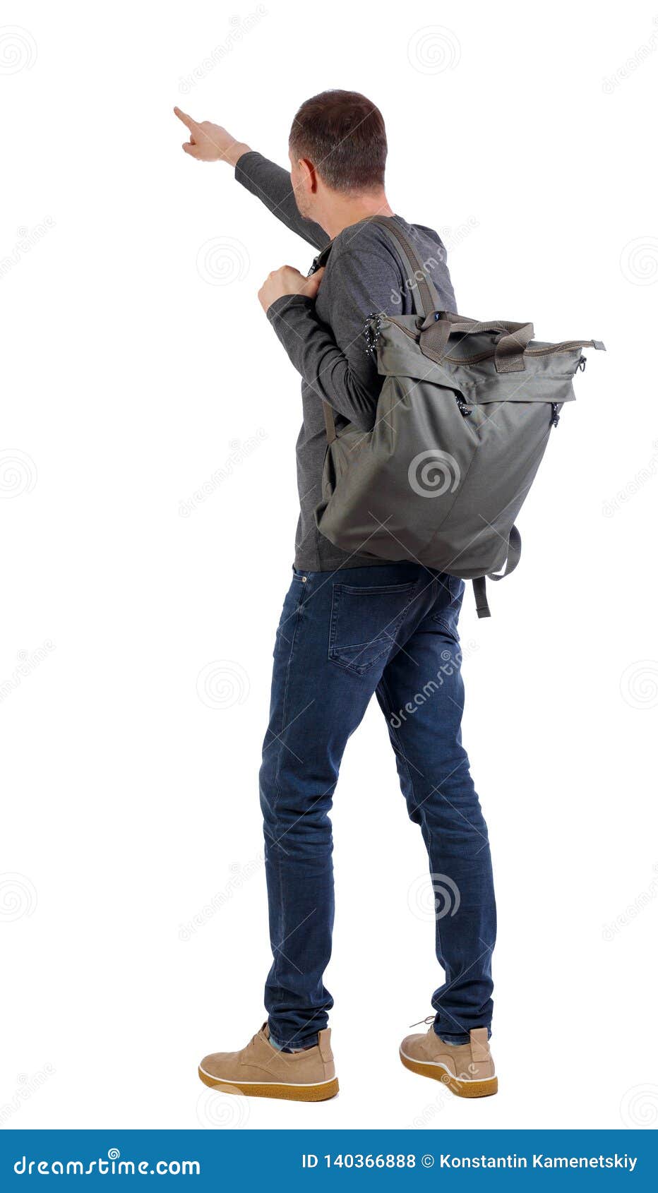 Back View of a Man with a Green Backpack Pointing Forward Stock Photo ...