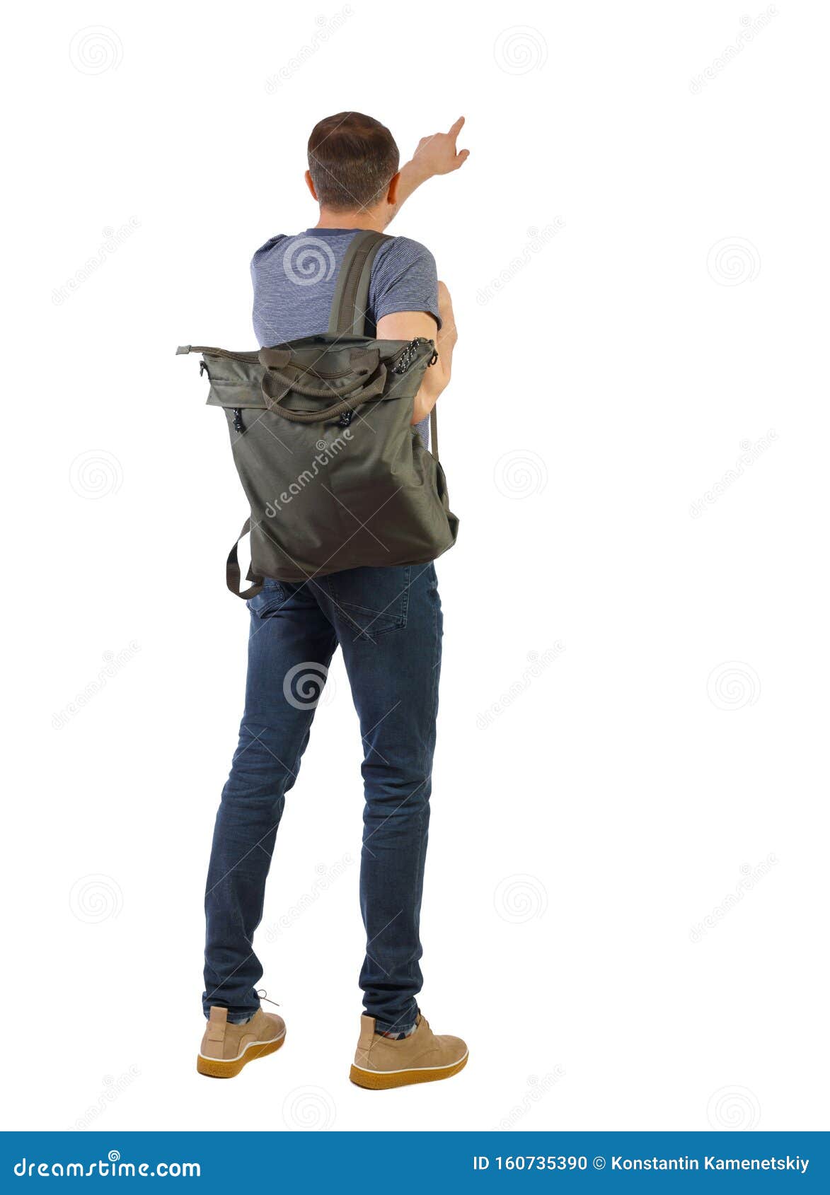 Back View of a Man with a Green Backpack Pointing Forward Stock Photo ...