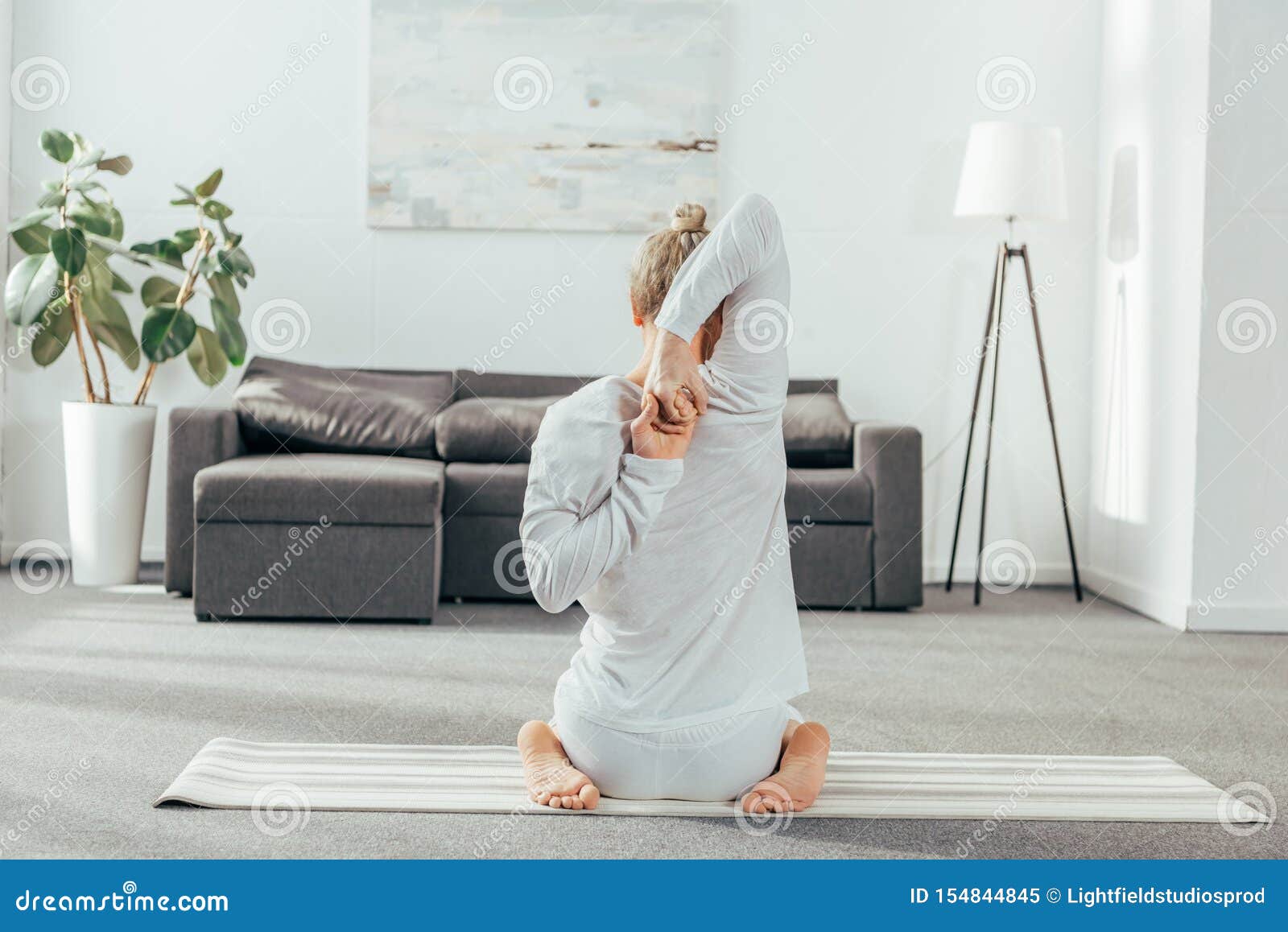 Back View of Man Practicing Yoga with Hands Behind Back Stock Image ...