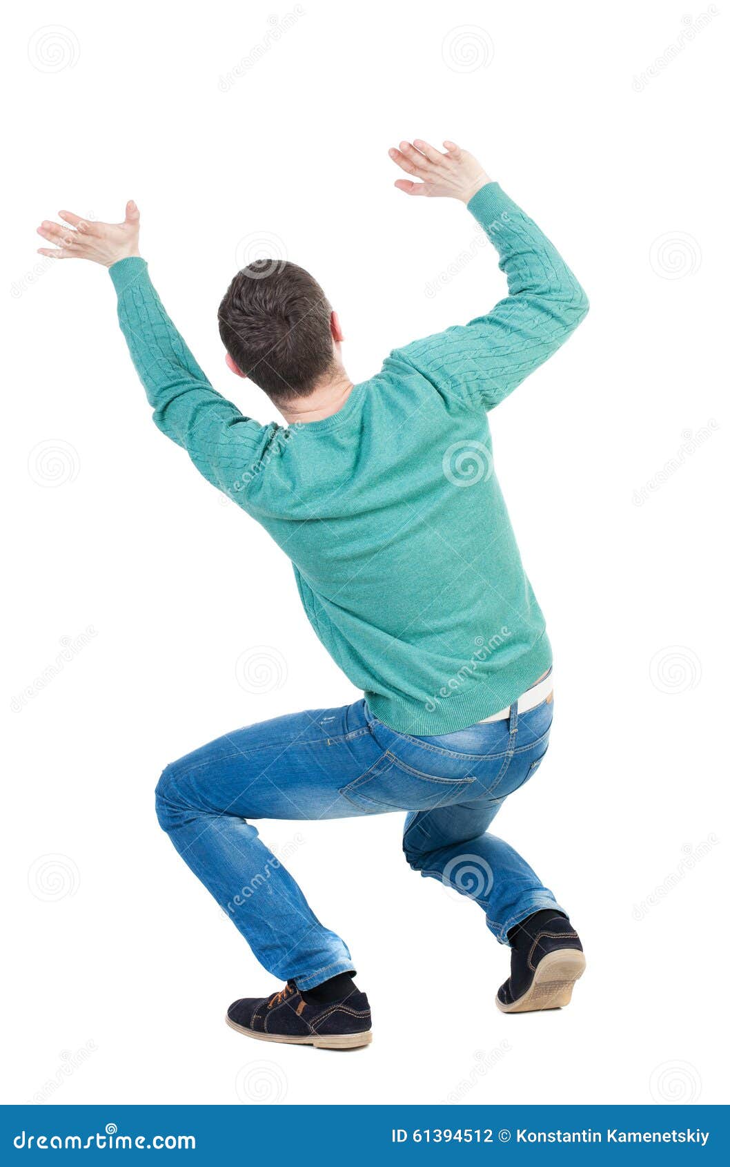 Back View. Man Protects Hands from What is Falling from Above Stock ...