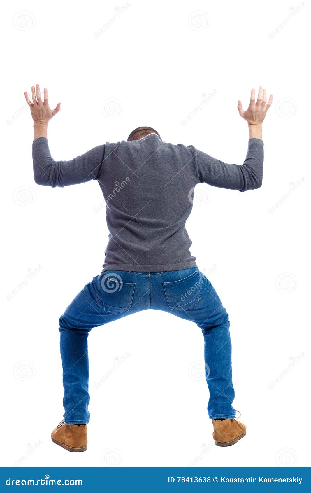 Back View. Man Protects Hands from What is Falling Above. Stock Photo ...