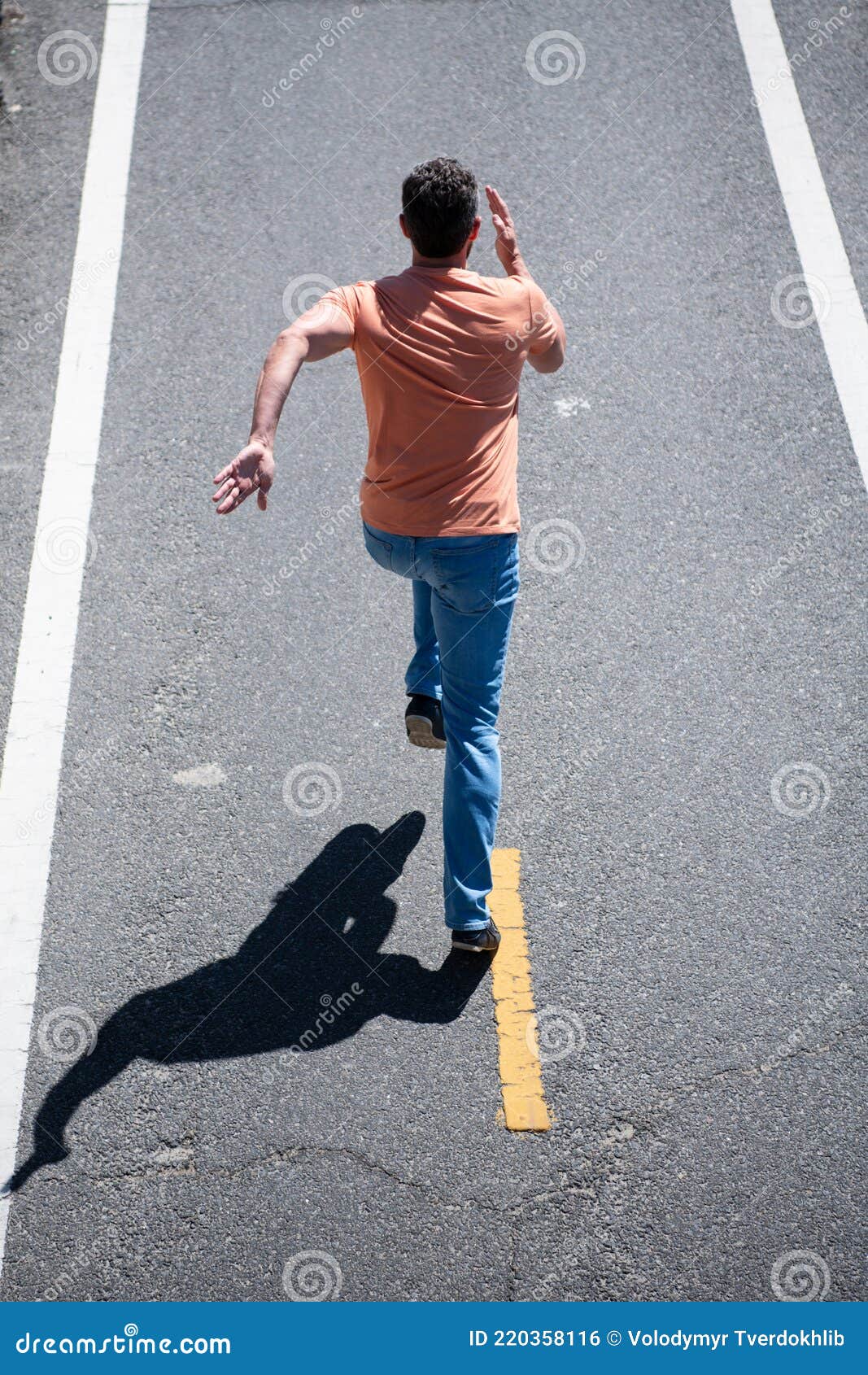 Back View of Man Running on the Road. Active Healthy Runner Jogging ...