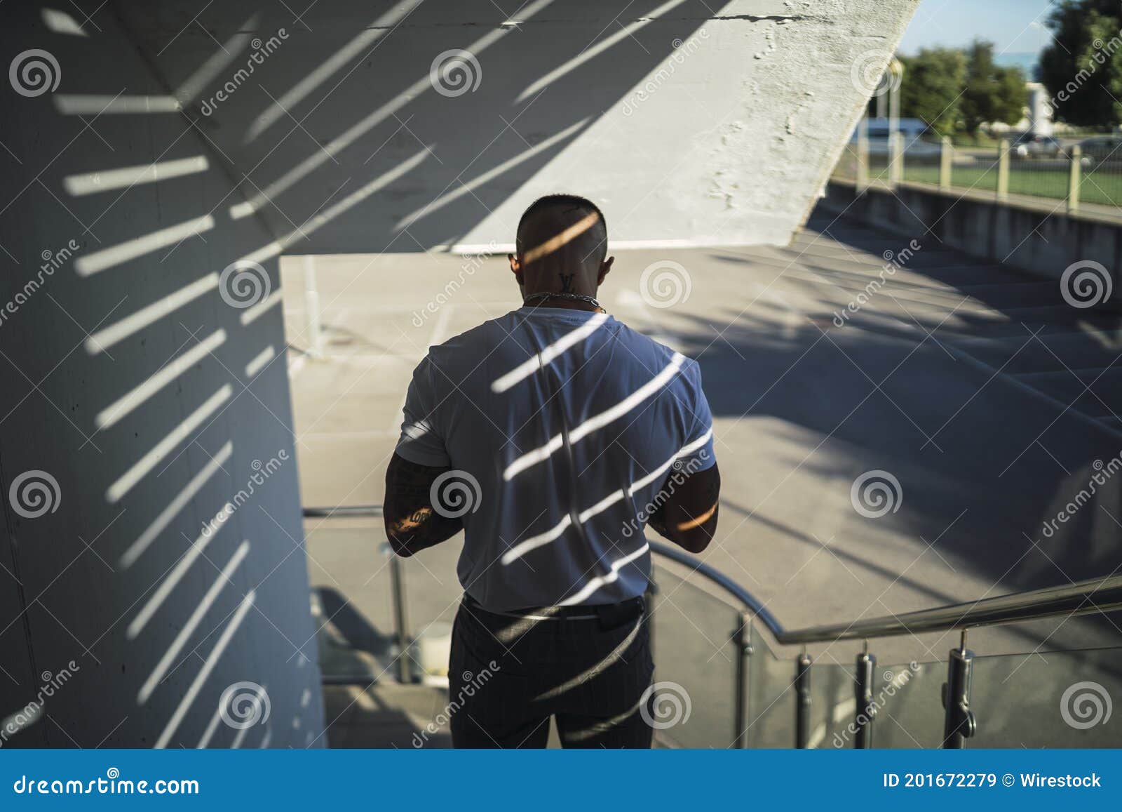 Back View of a Man with Shadows Falling on His Back Stock Image - Image ...