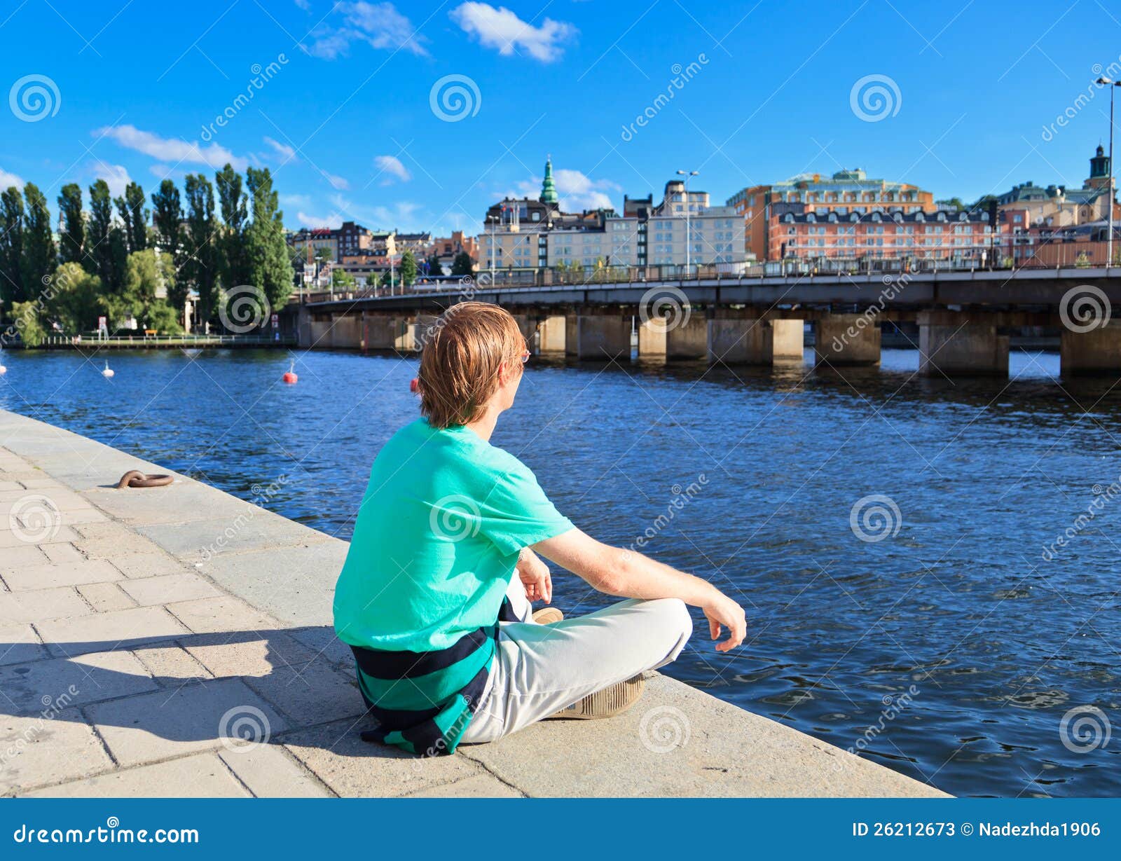 Back View of Man Sitting on Pier Stock Image - Image of back, jetty ...