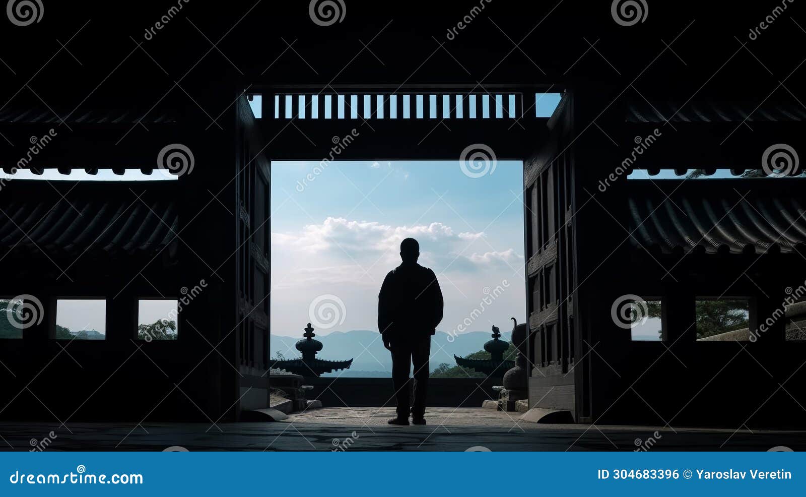Back View of Man Standing in the Temple at the Gateway with Mountain ...