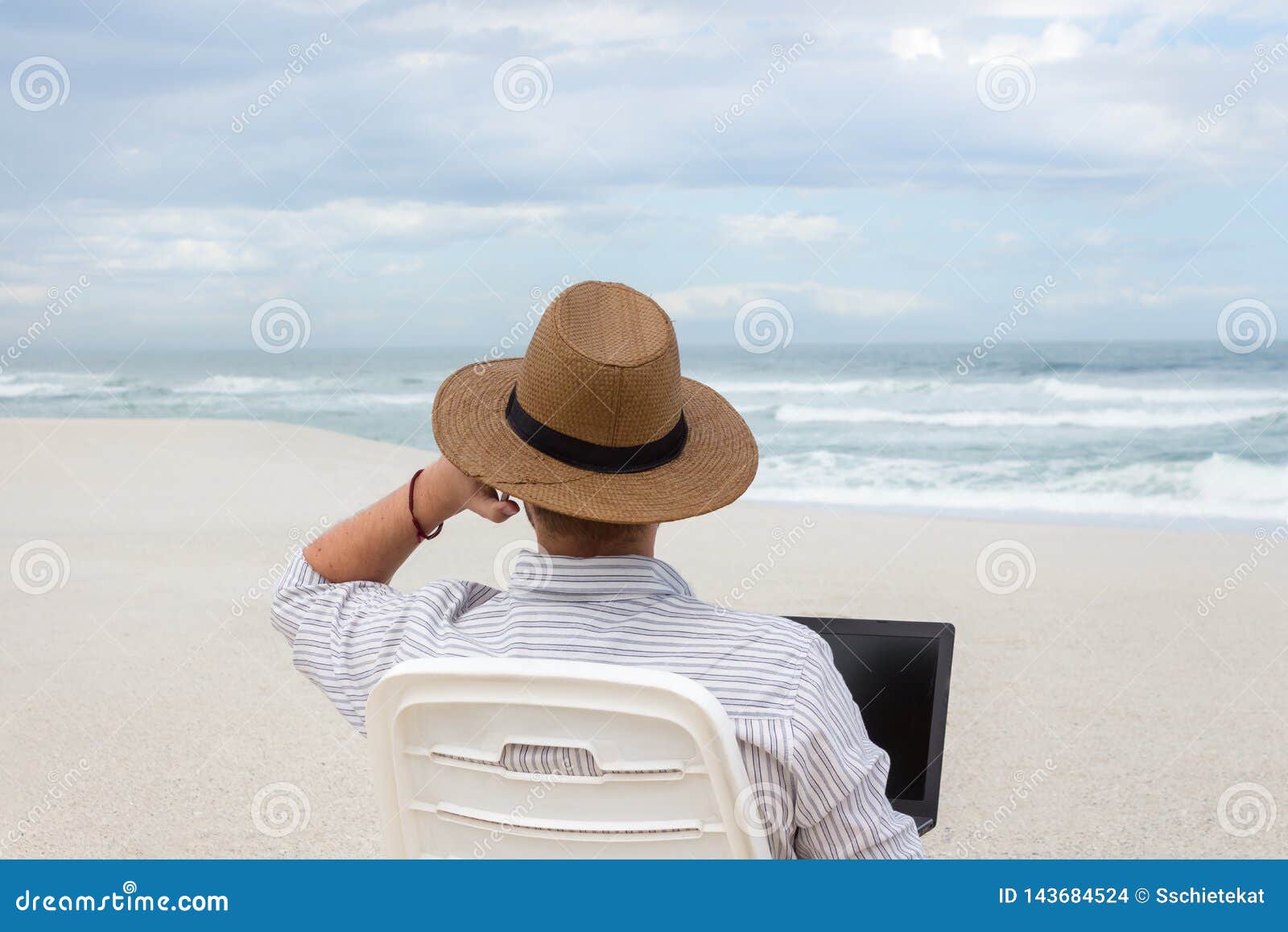 Man Working and Taking Phone Calls while on the Beach Stock Photo ...