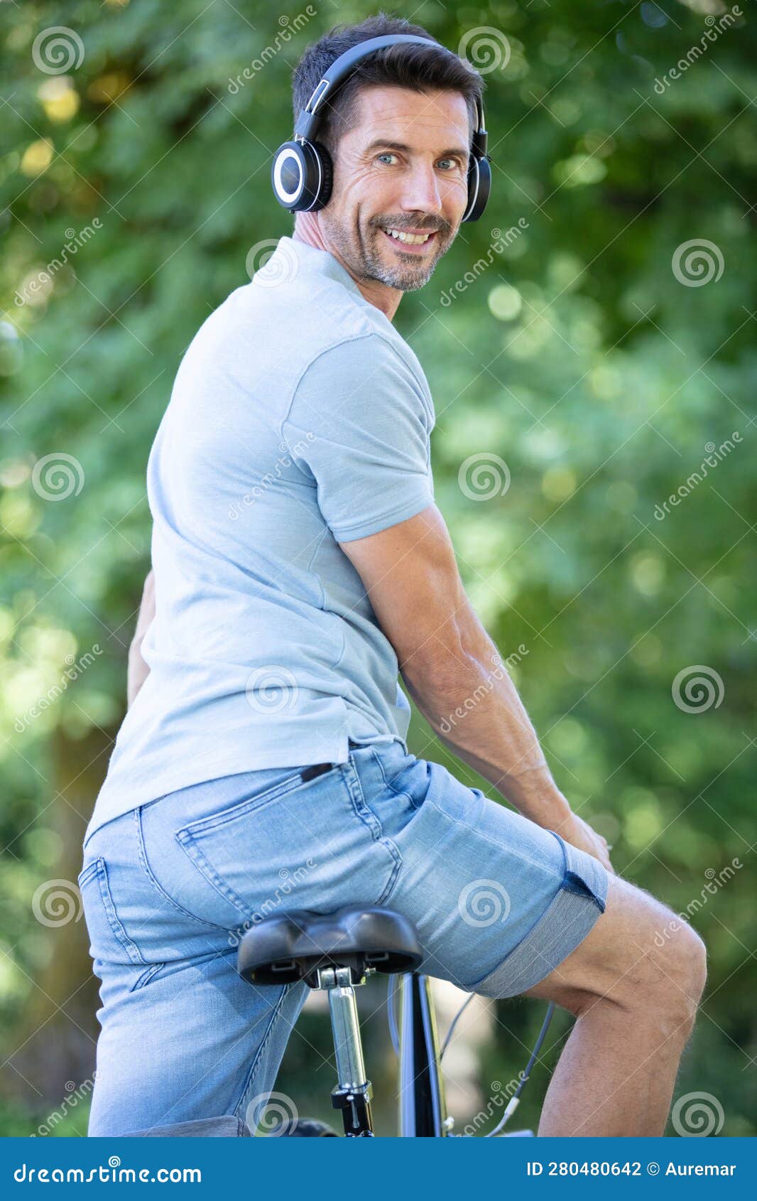 Back View Man Wearing Earphones with Bicycle Stock Photo - Image of ...