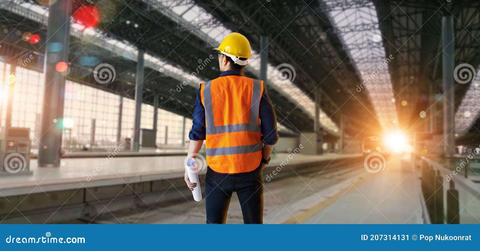 Back View of Manager Industrial Engineer Standing and Holding a ...