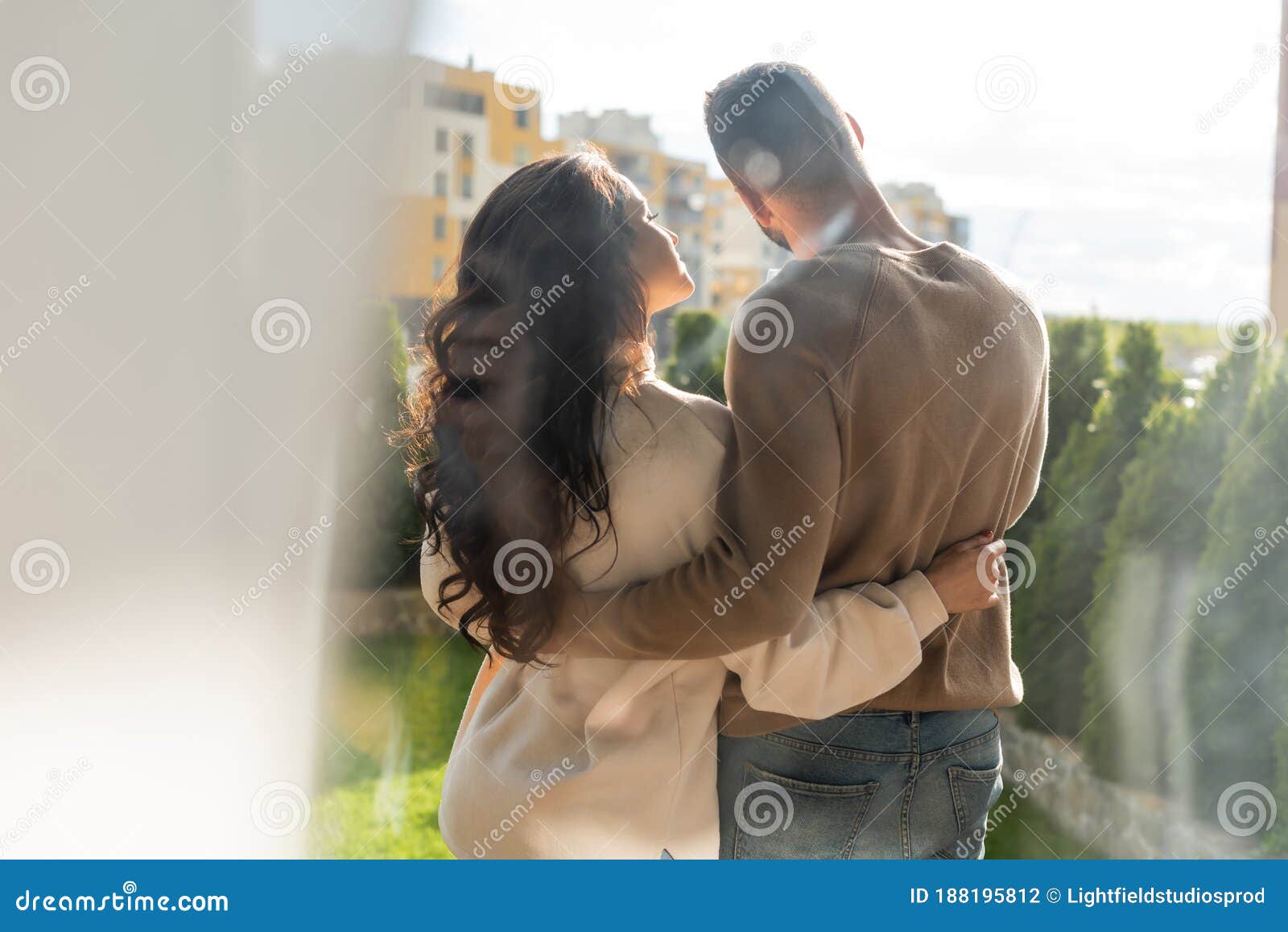 View of Man Standing and Hugging Stock Photo - Image of indoors ...
